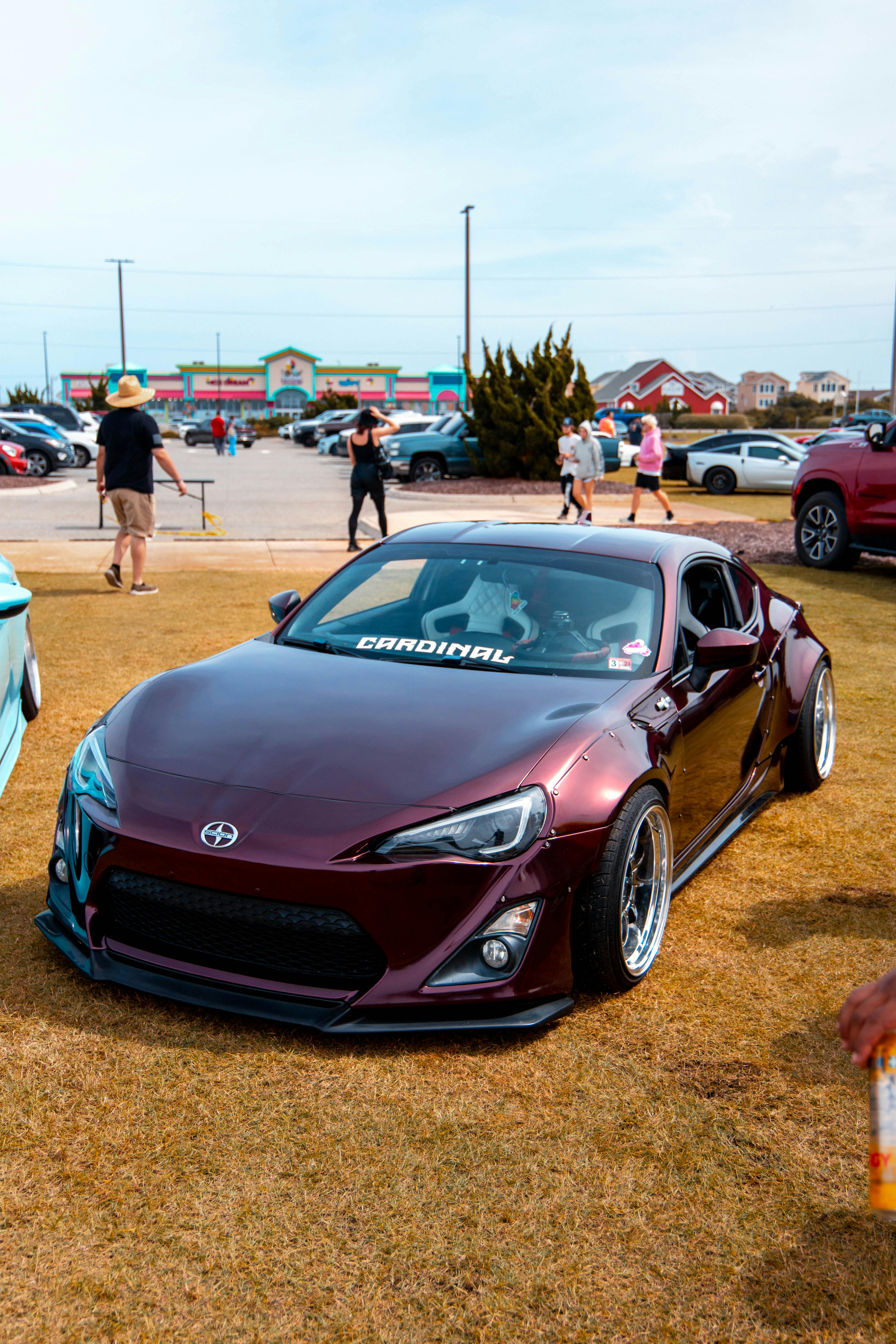 Customized Purple Sports Car at Outdoor Event · Free Stock Photo