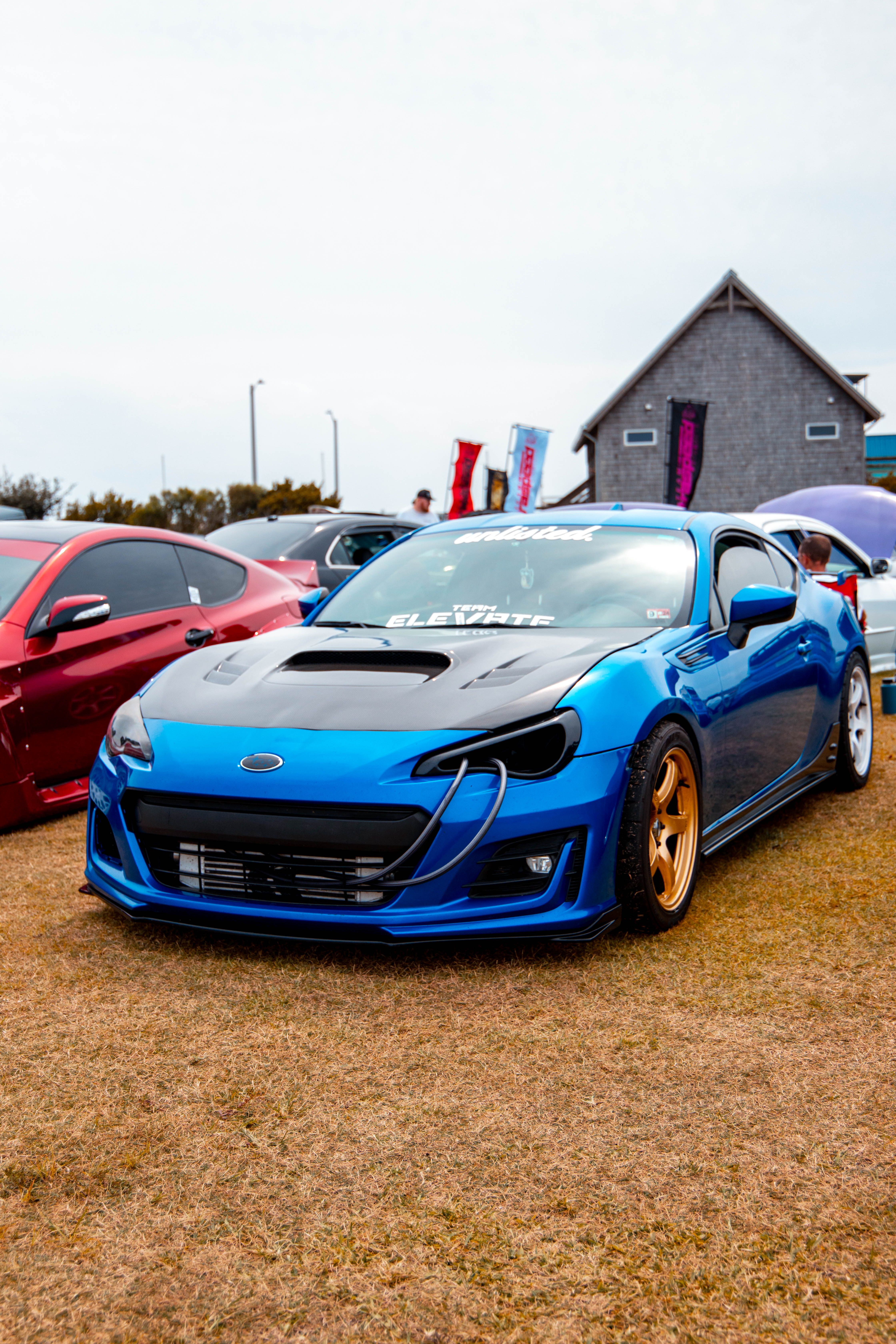 Vibrant Blue Sports Car at Auto Show · Free Stock Photo