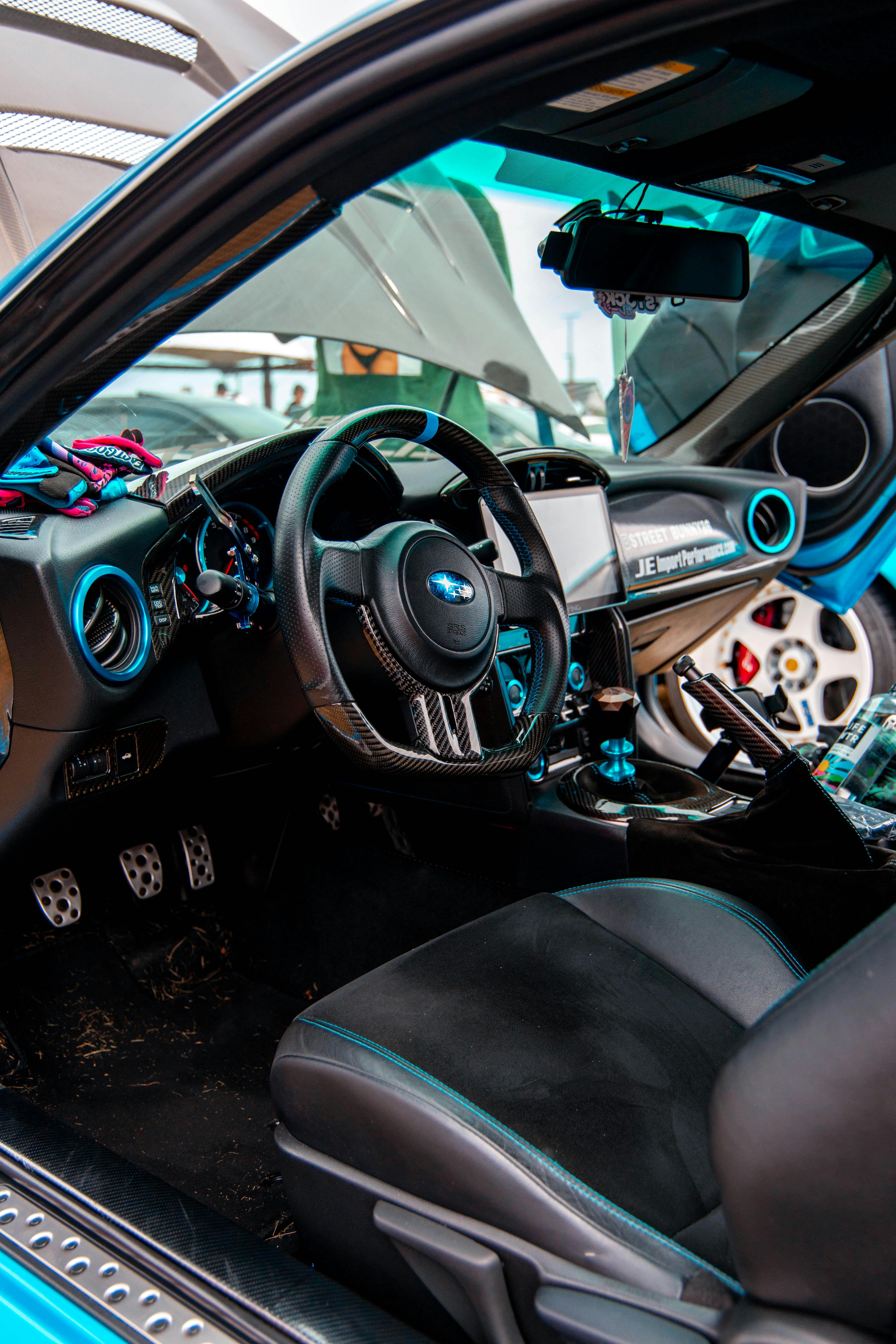 Vibrant sports car interior with racing details · Free Stock Photo