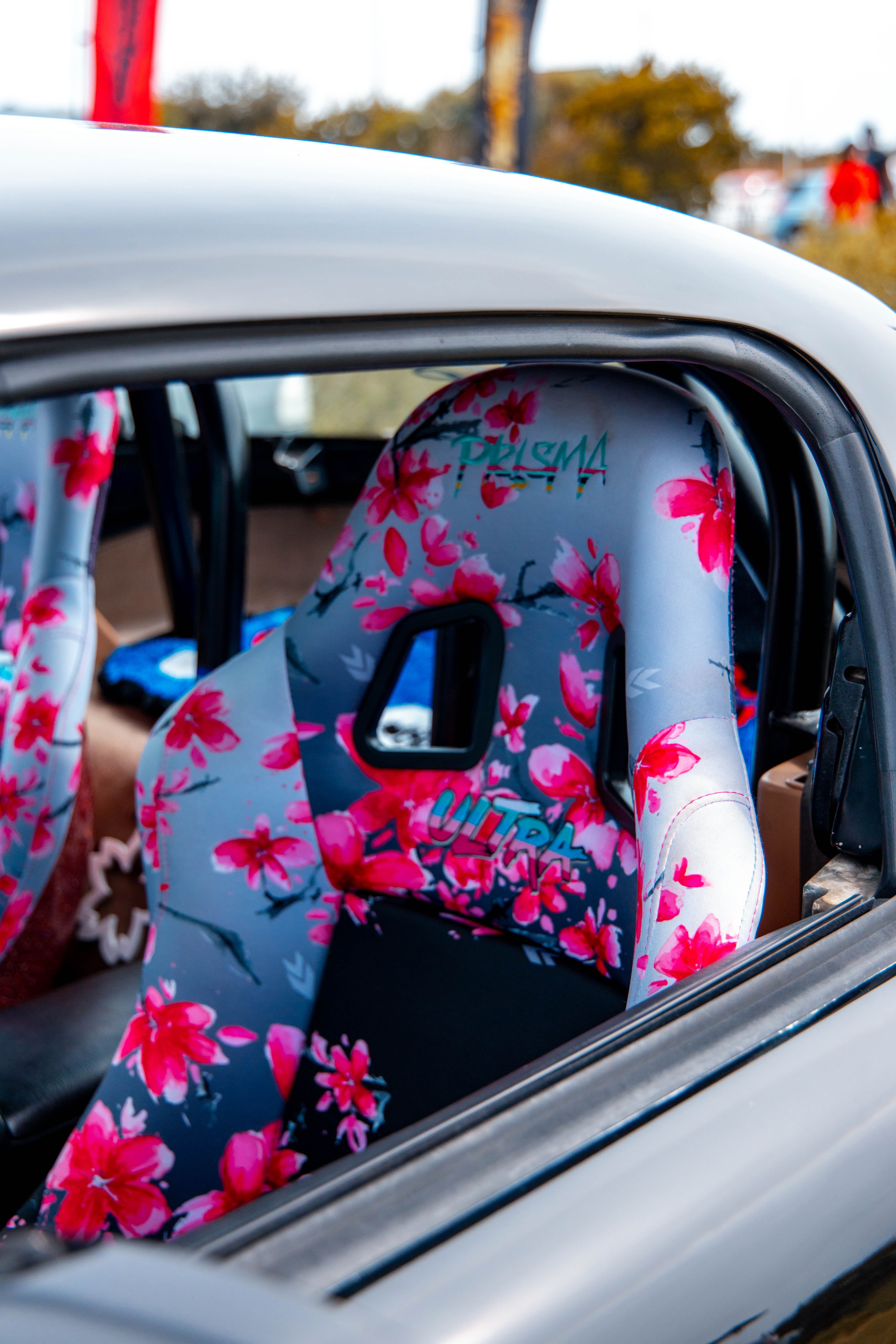 Floral Car Seat Interior Design in Black Vehicle · Free Stock Photo