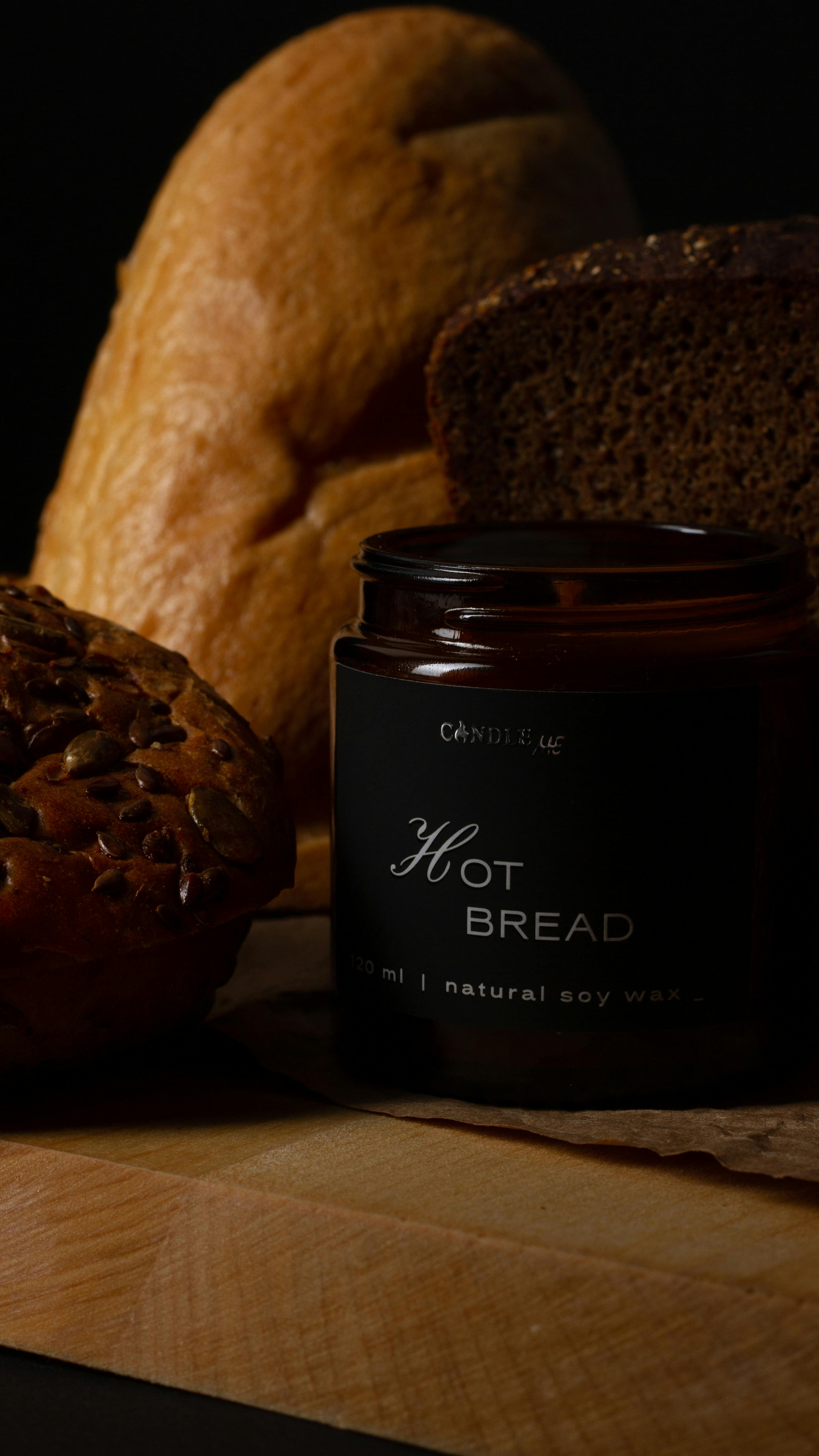 Artistic Display of Bread and Soy Wax Candle · Free Stock Photo