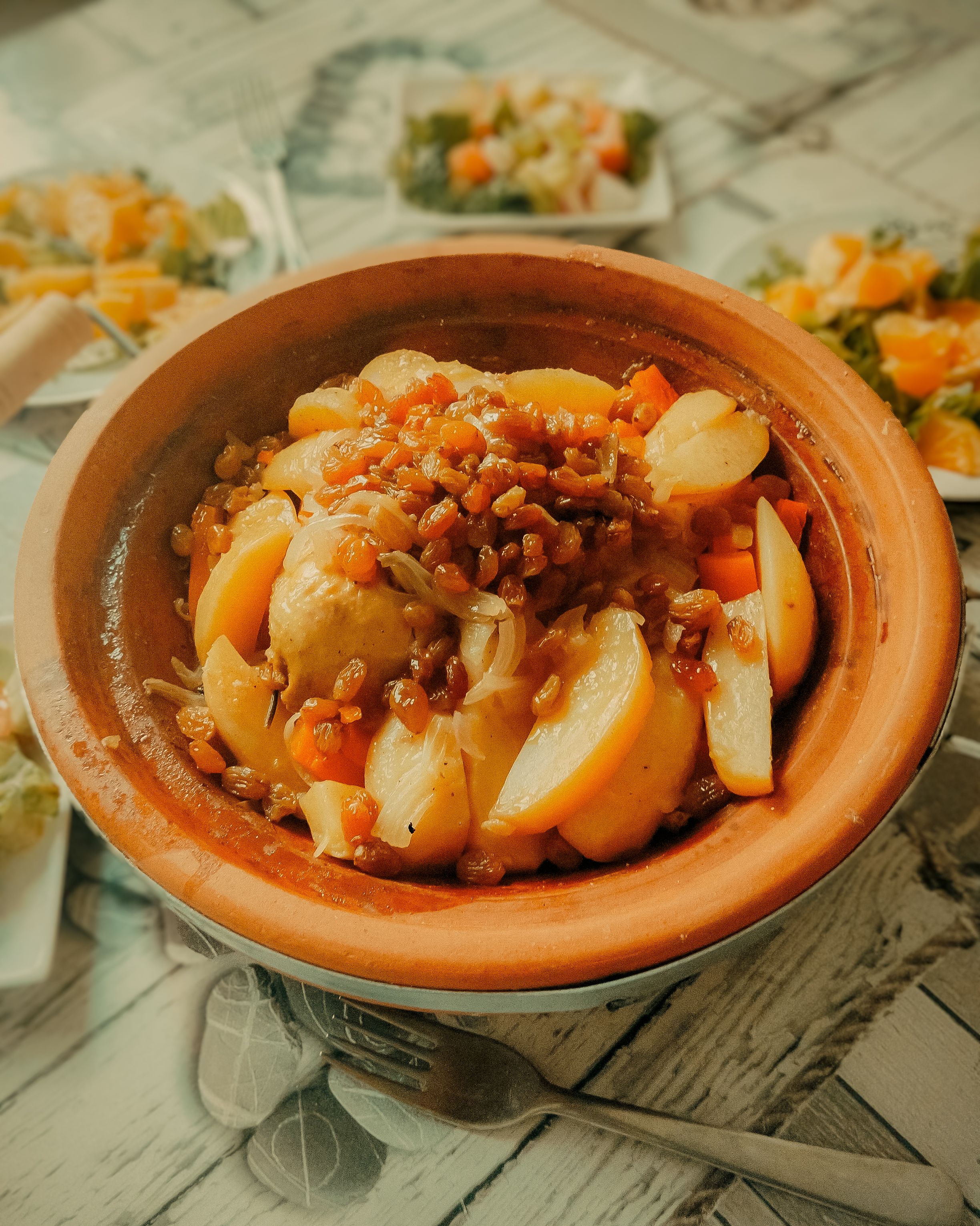 Delicious Moroccan Tajine with Raisins and Potatoes · Free Stock Photo