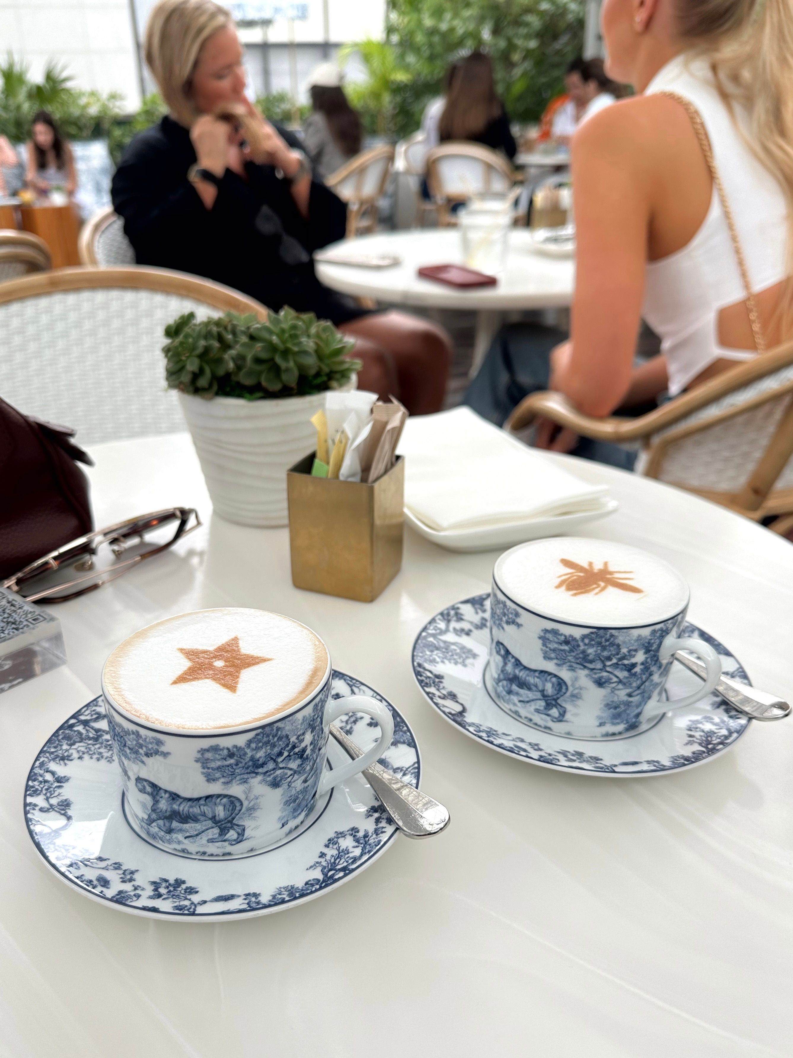 Cappuccino Art in Stylish Cafe Setting · Free Stock Photo
