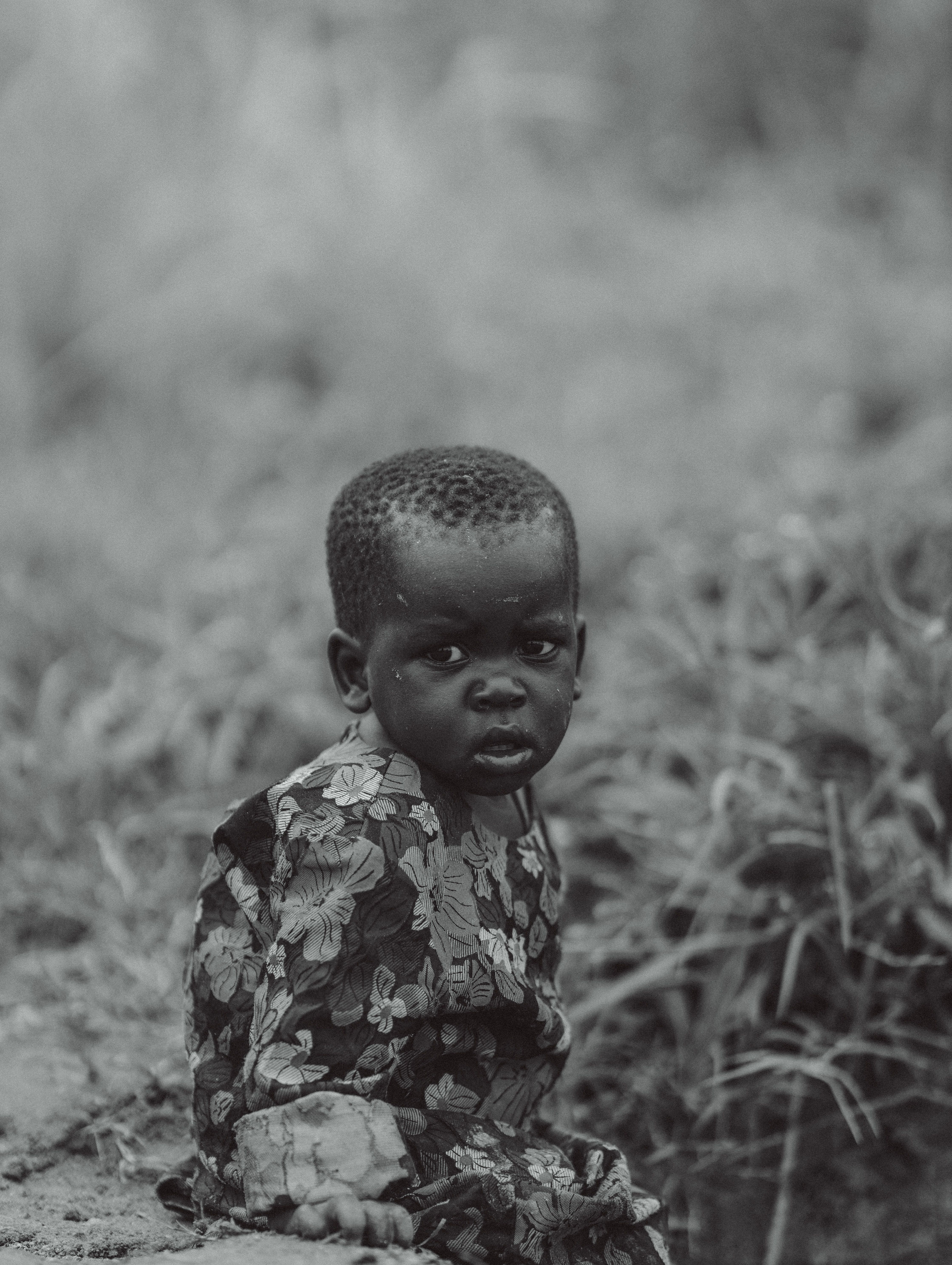 Monochrome Portrait of Child Outdoors · Free Stock Photo
