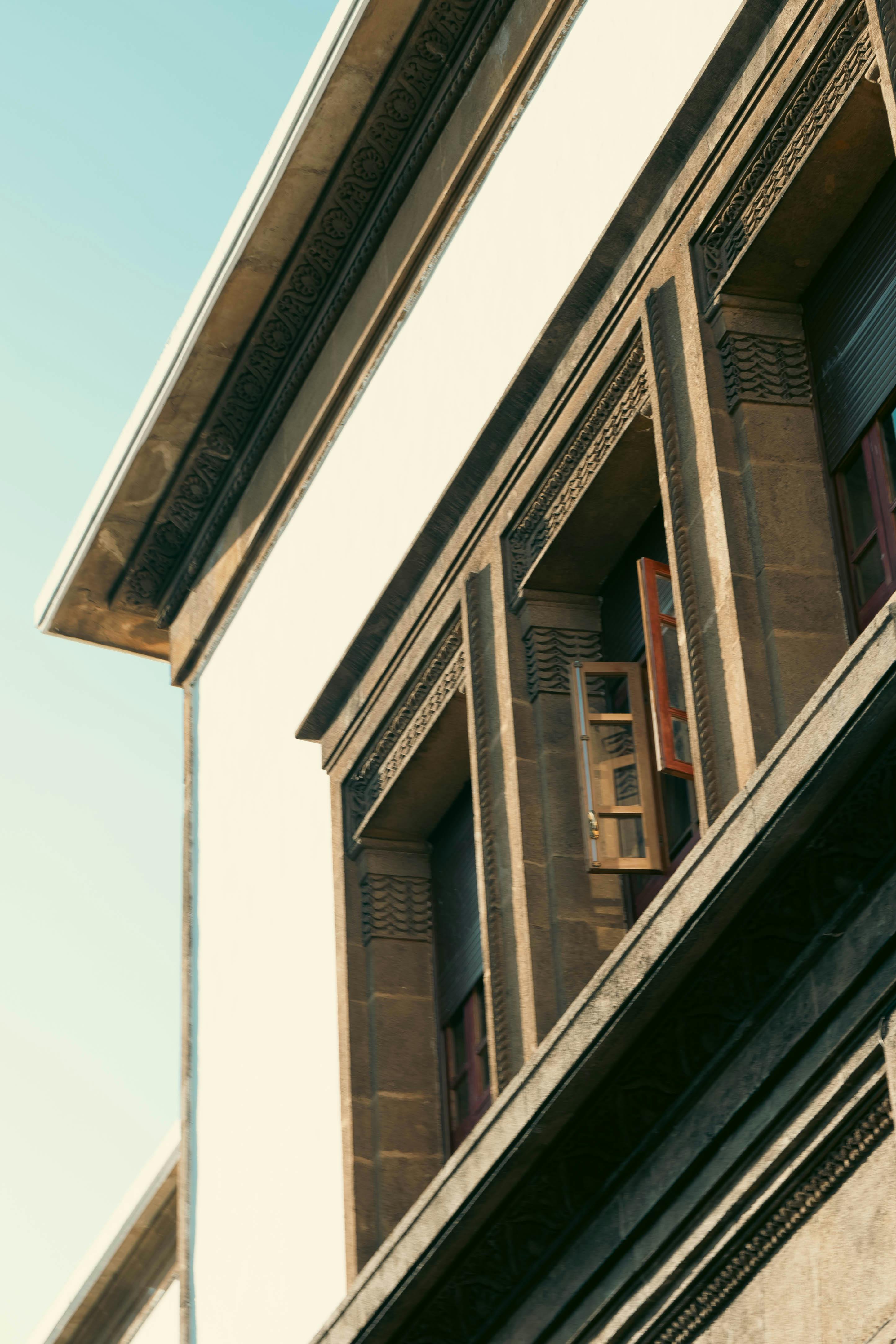 Vintage Architectural Detail with Open Window · Free Stock Photo