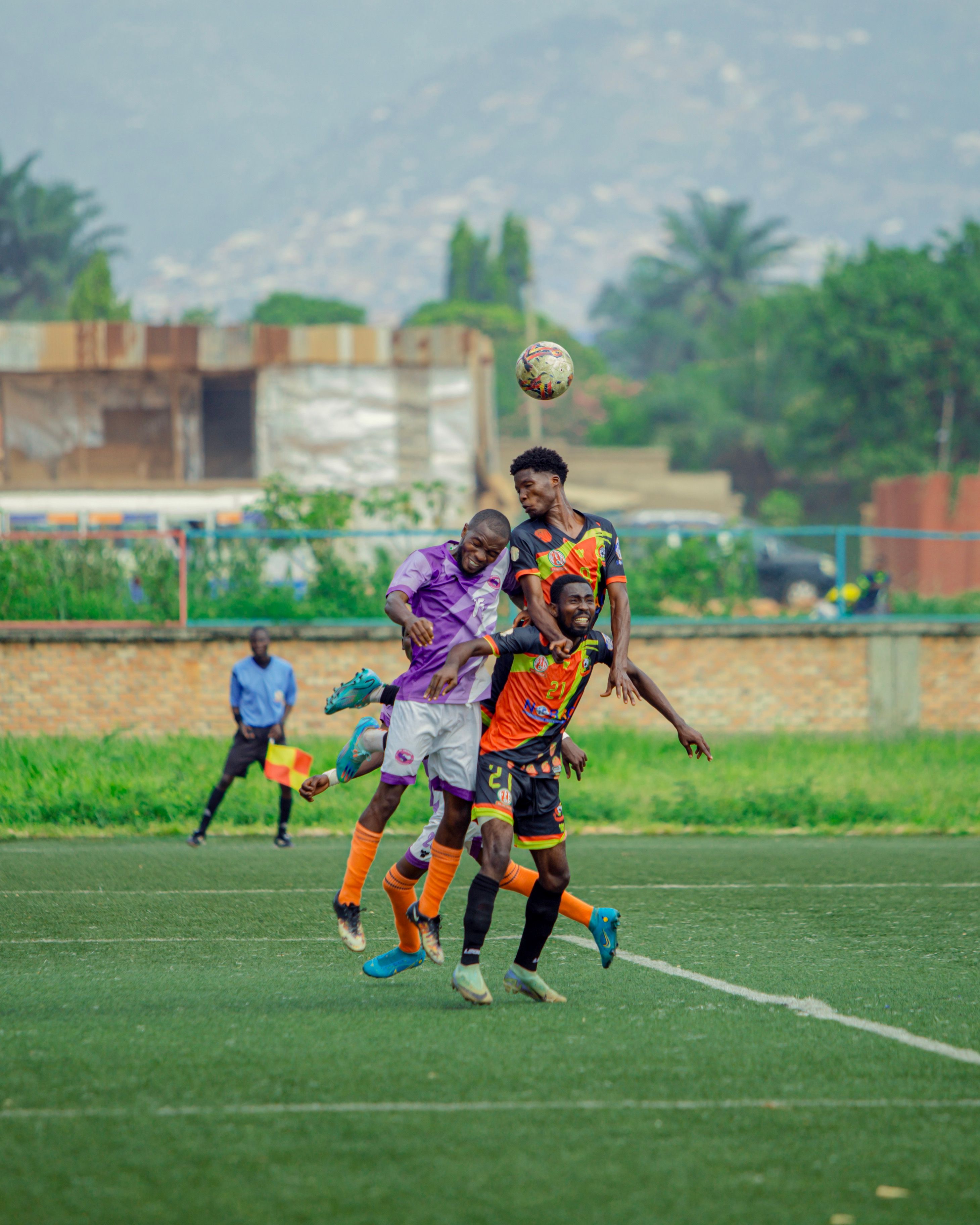 Dynamic Soccer Match Making a Header Play · Free Stock Photo