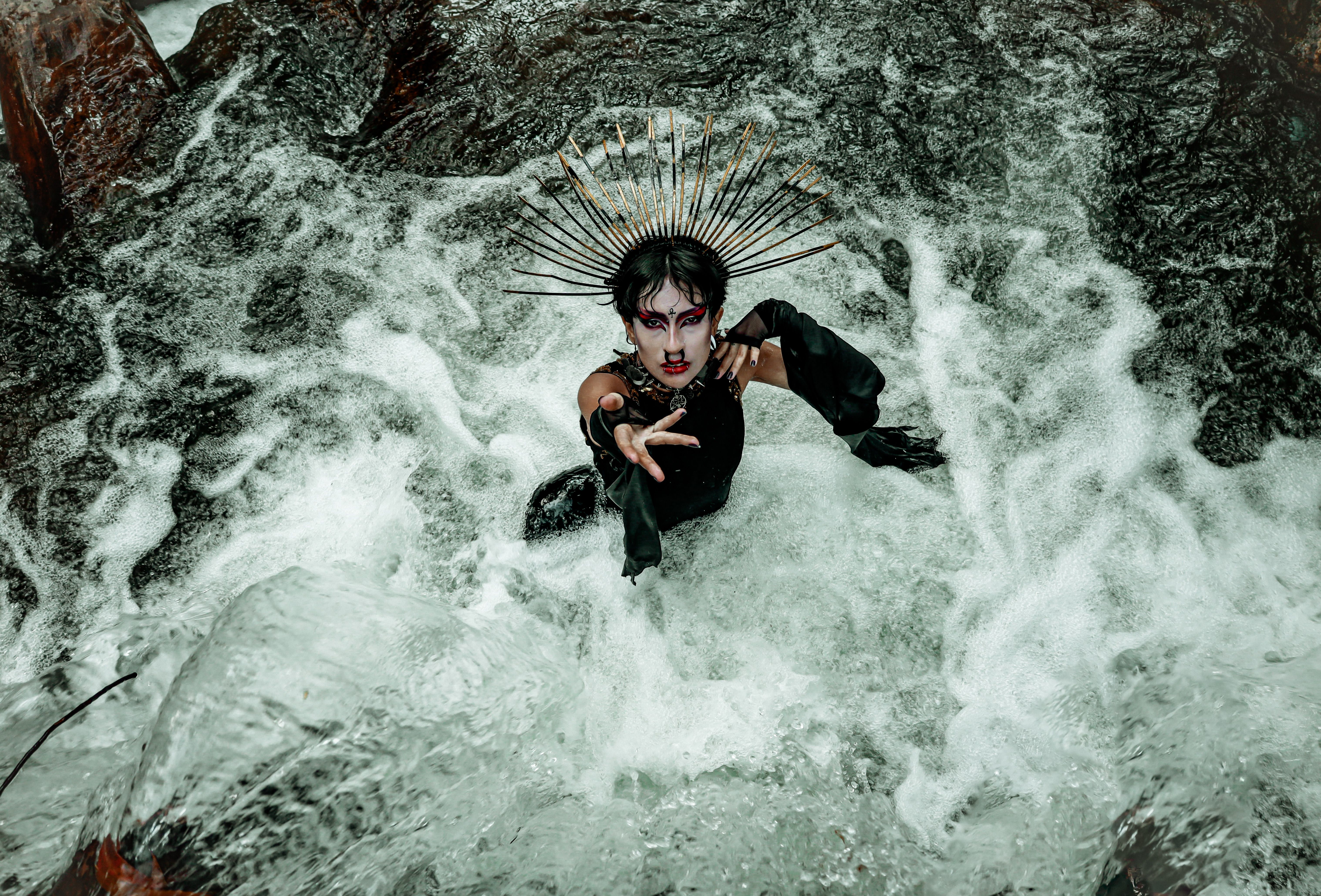 Dramatic Pose in River with Artistic Headpiece · Free Stock Photo