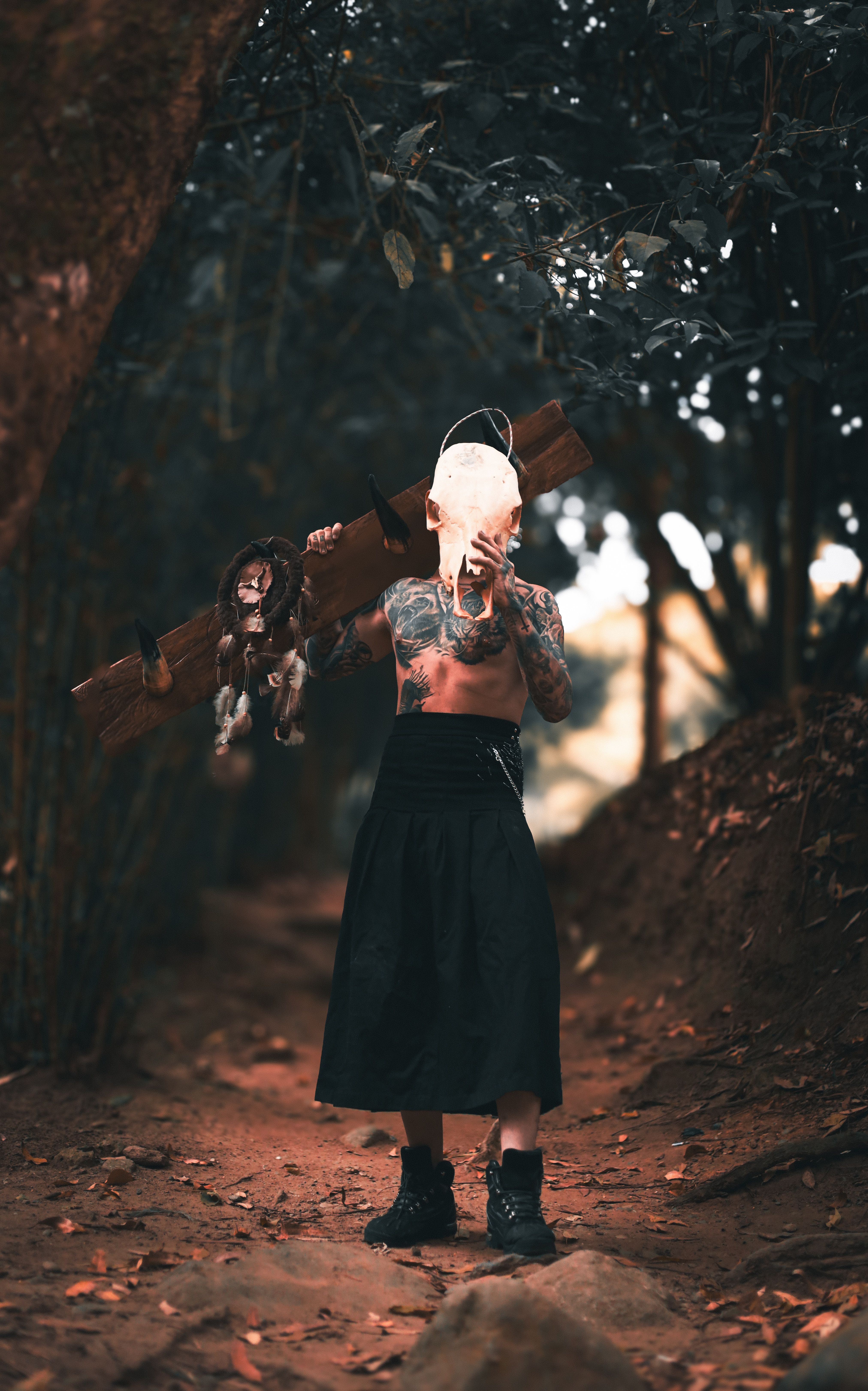 Mystical Forest Figure with Mask and Tattoos · Free Stock Photo