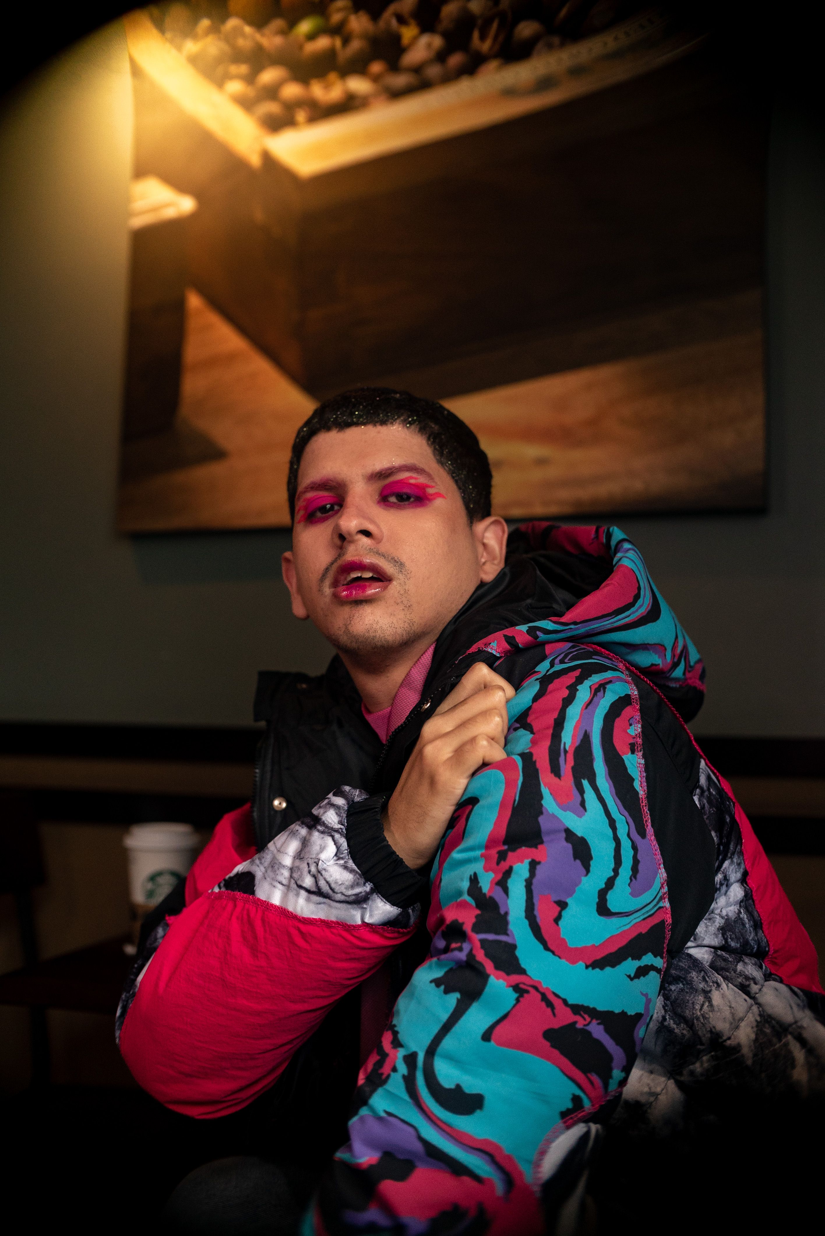 Colorful Fashion Portrait in Urban Café Setting · Free Stock Photo