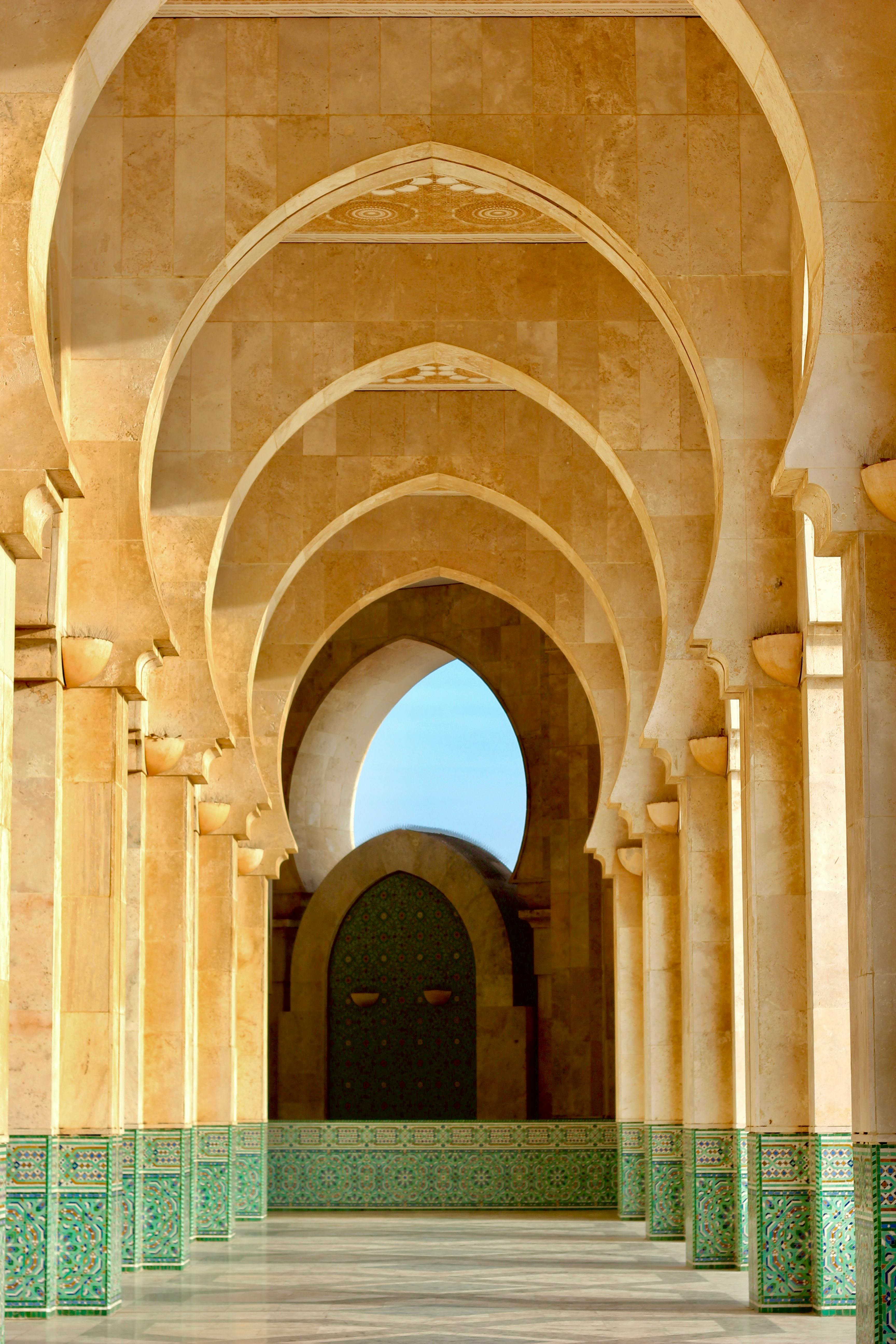 Architectural Arches in Historic Mosque Courtyard · Free Stock Photo