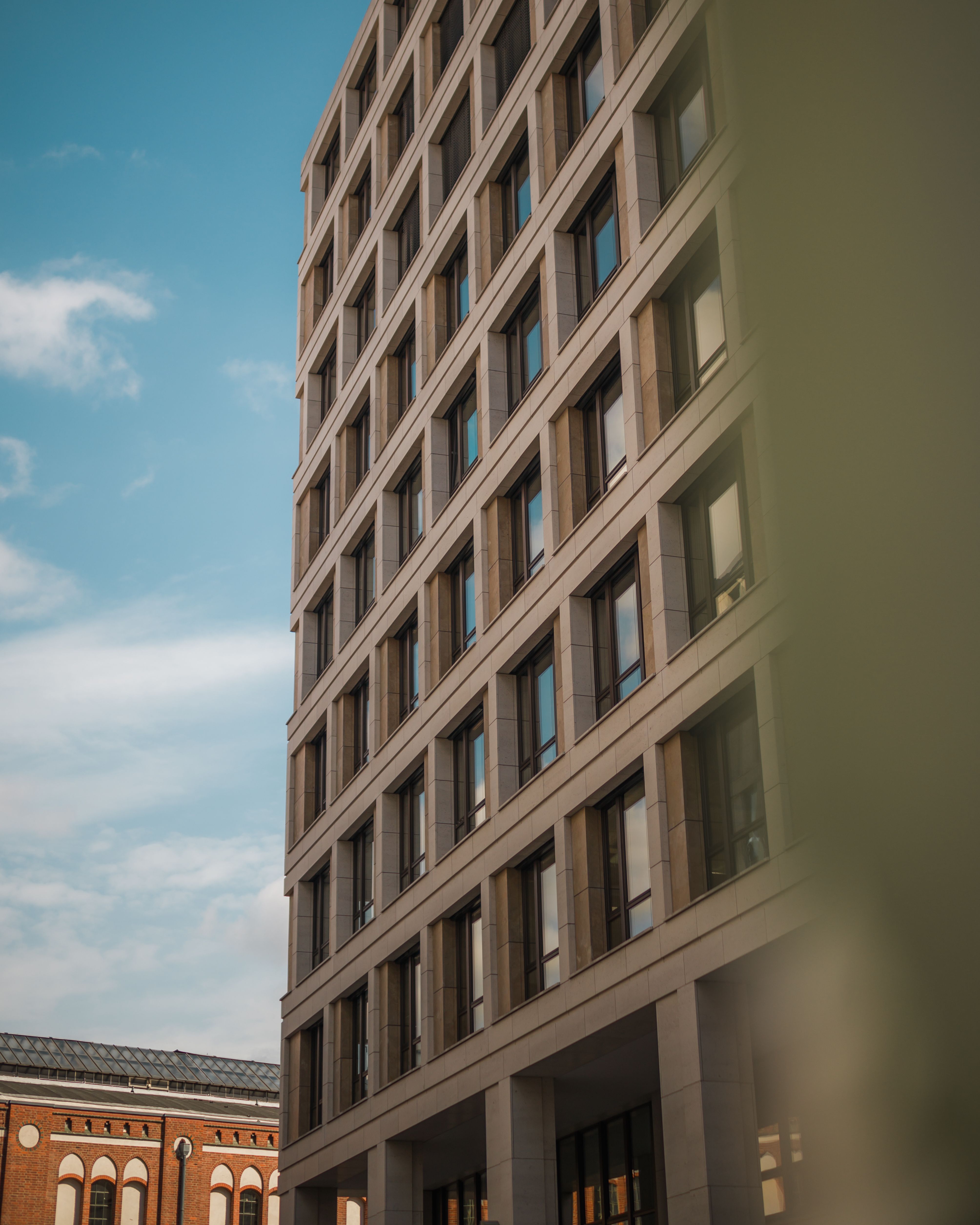 Modern Office Building in Berlin under Blue Sky · Free Stock Photo