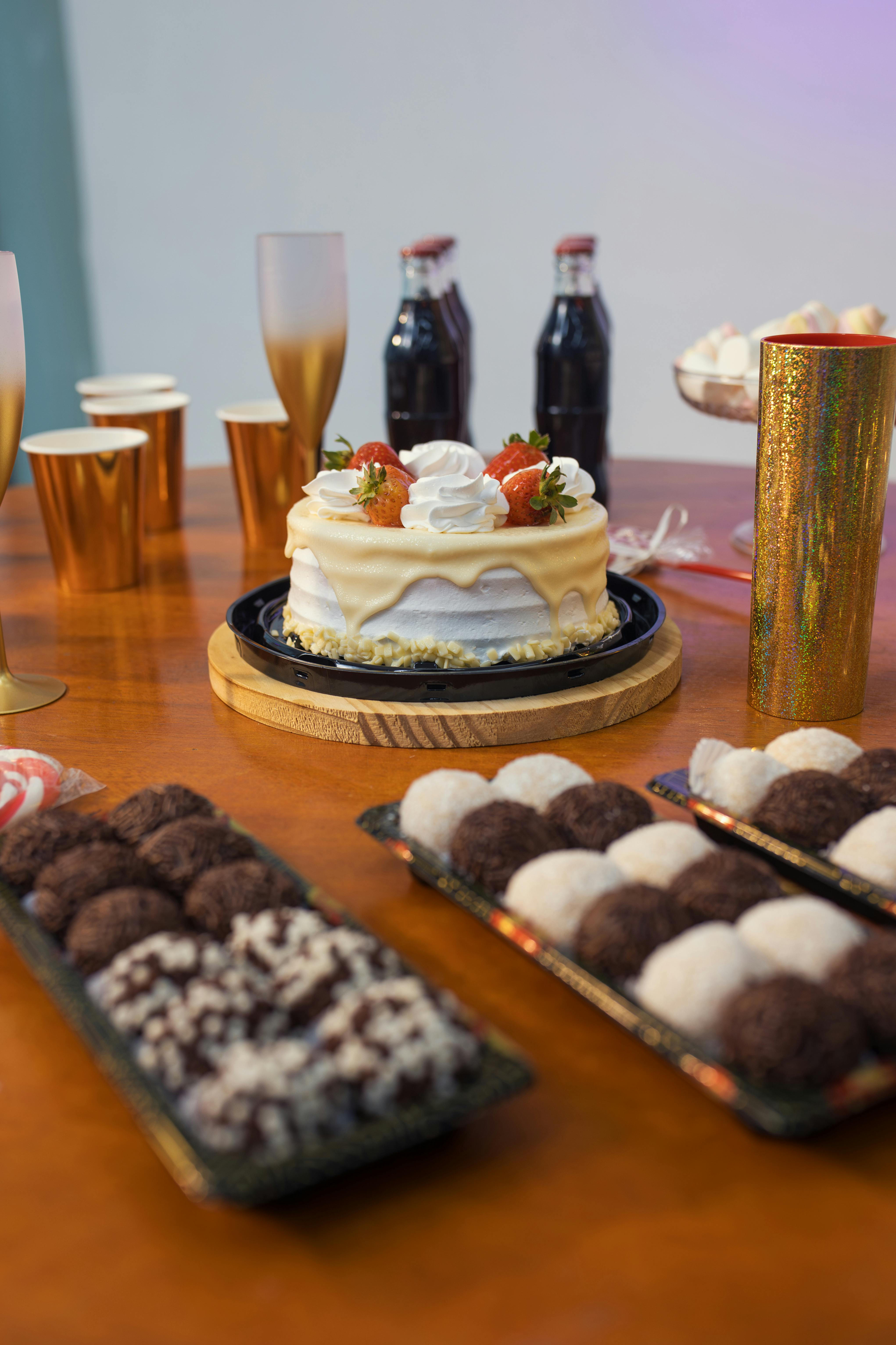 Brazilian Birthday Celebration with Cake and Sweets · Free Stock Photo