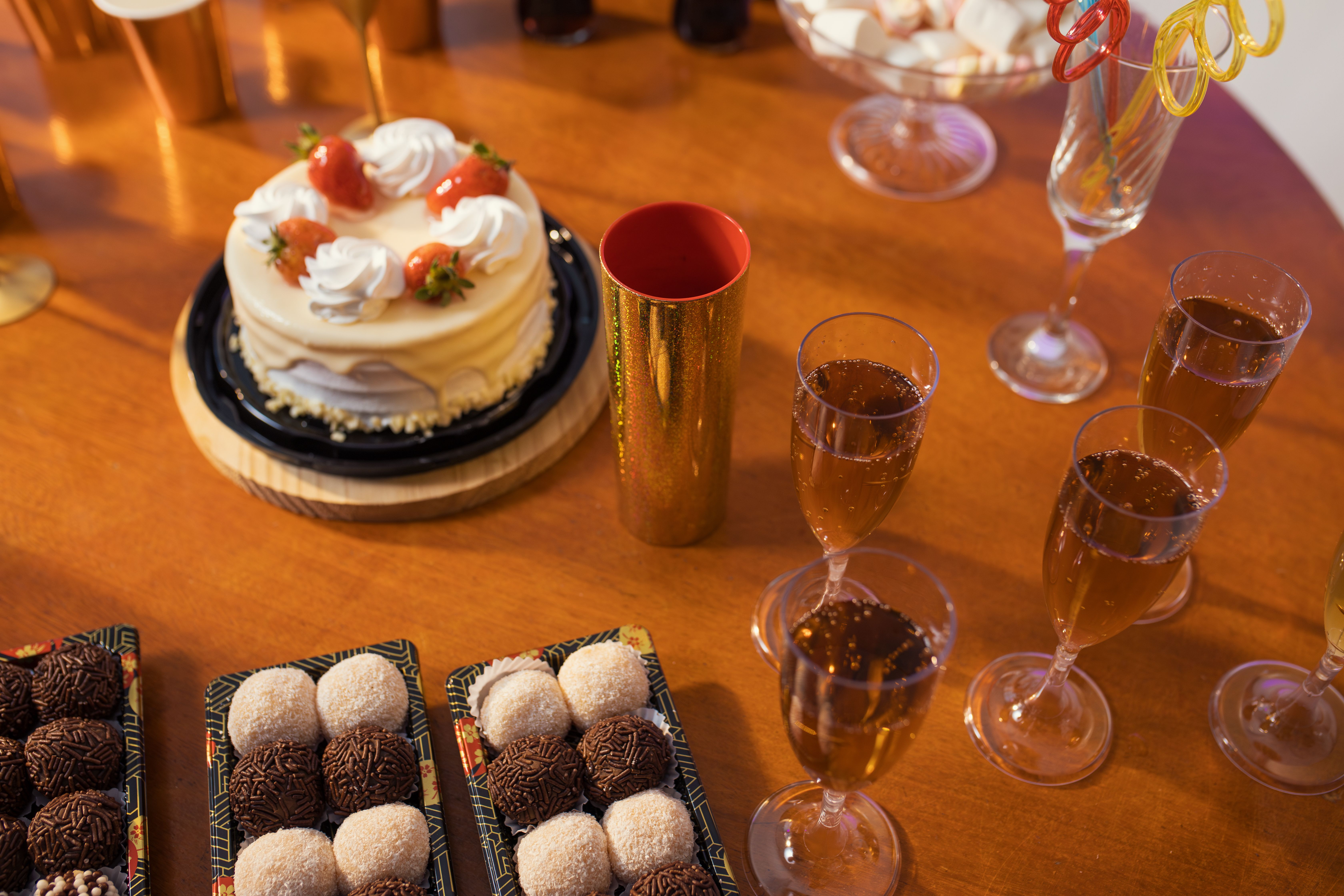 Festive Brazilian Dessert Table with Cake and Treats · Free Stock Photo