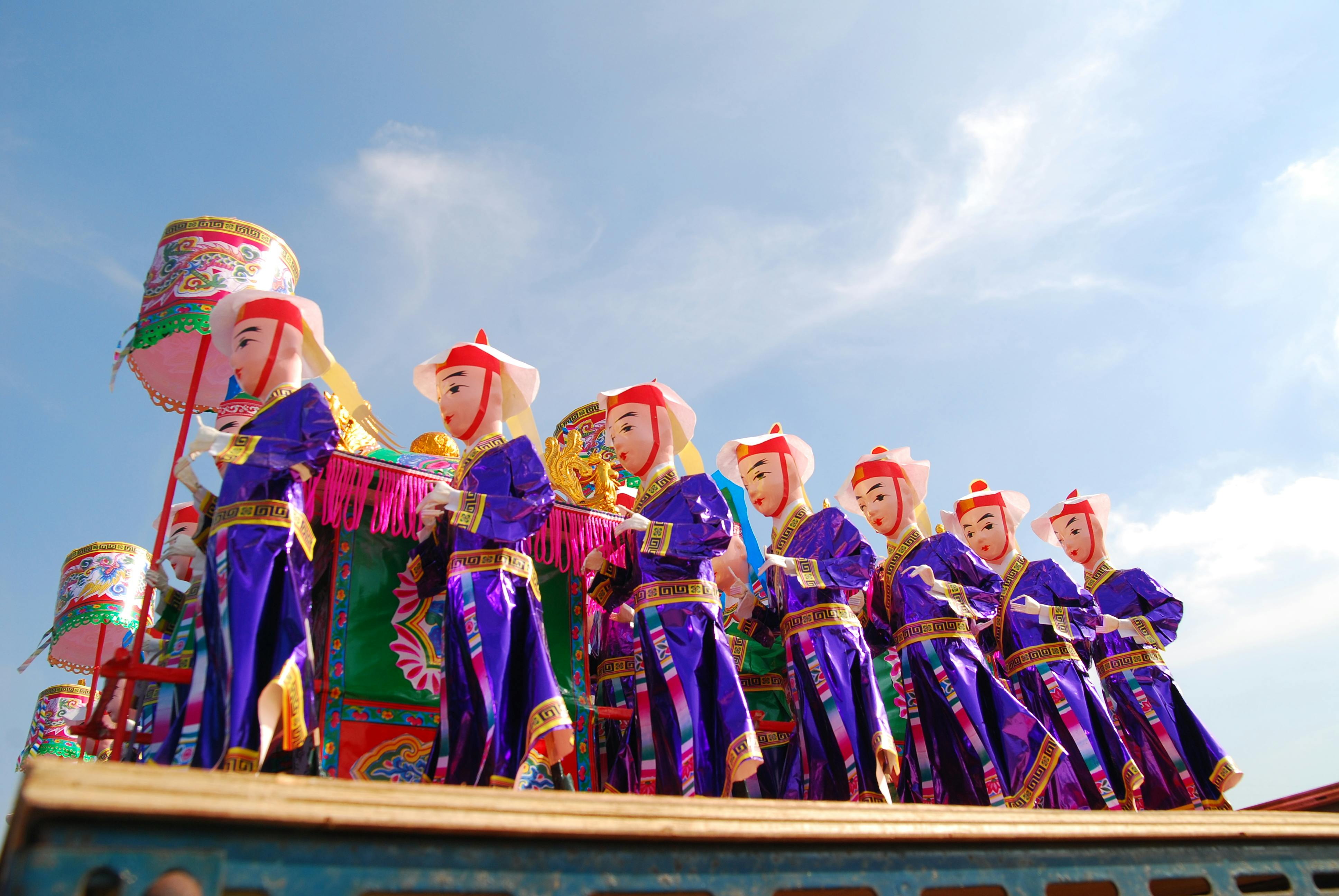 Colorful Traditional Puppet Display Outdoors · Free Stock Photo