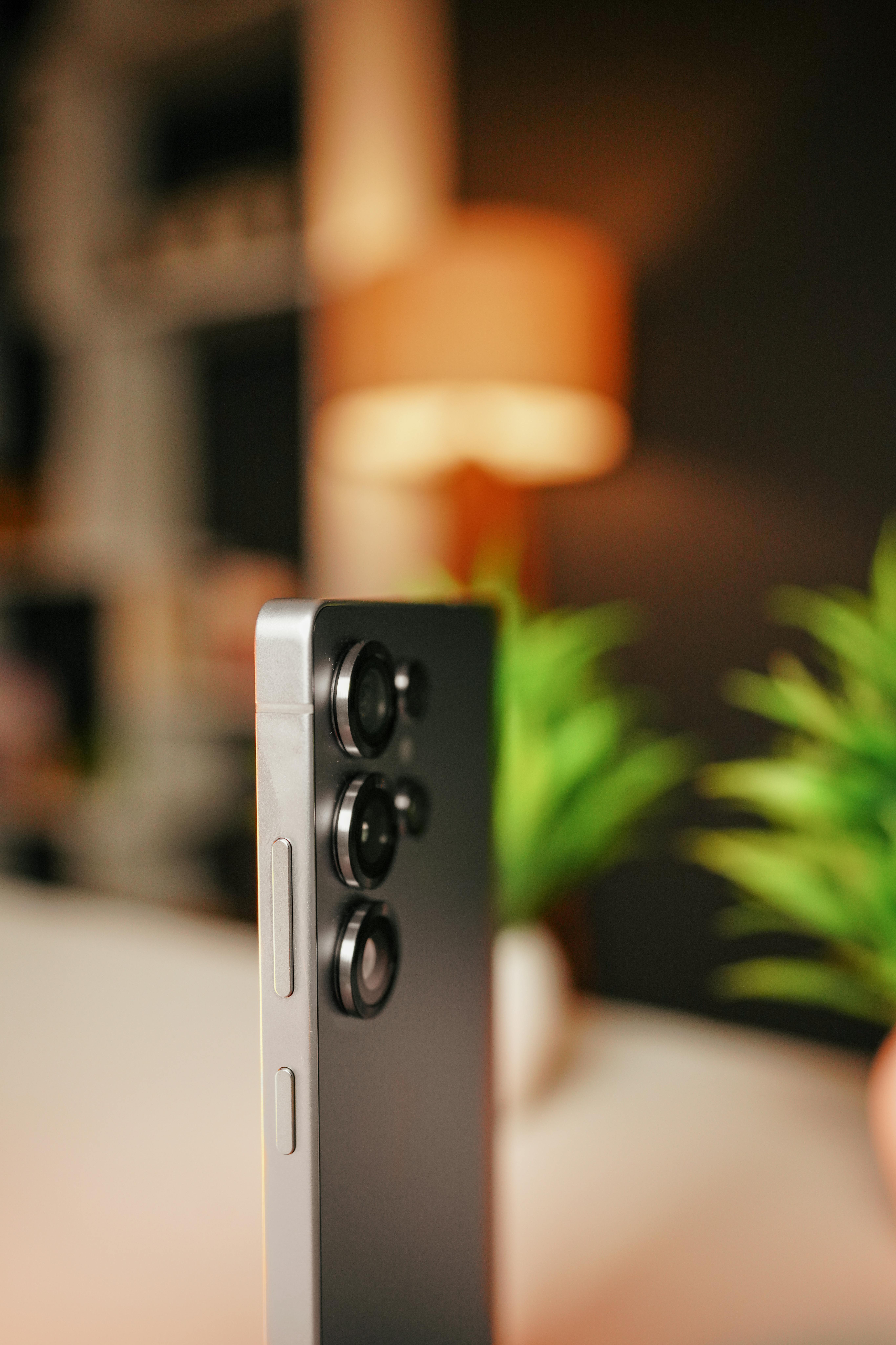 Close-up of Modern Smartphone with Triple Cameras · Free Stock Photo