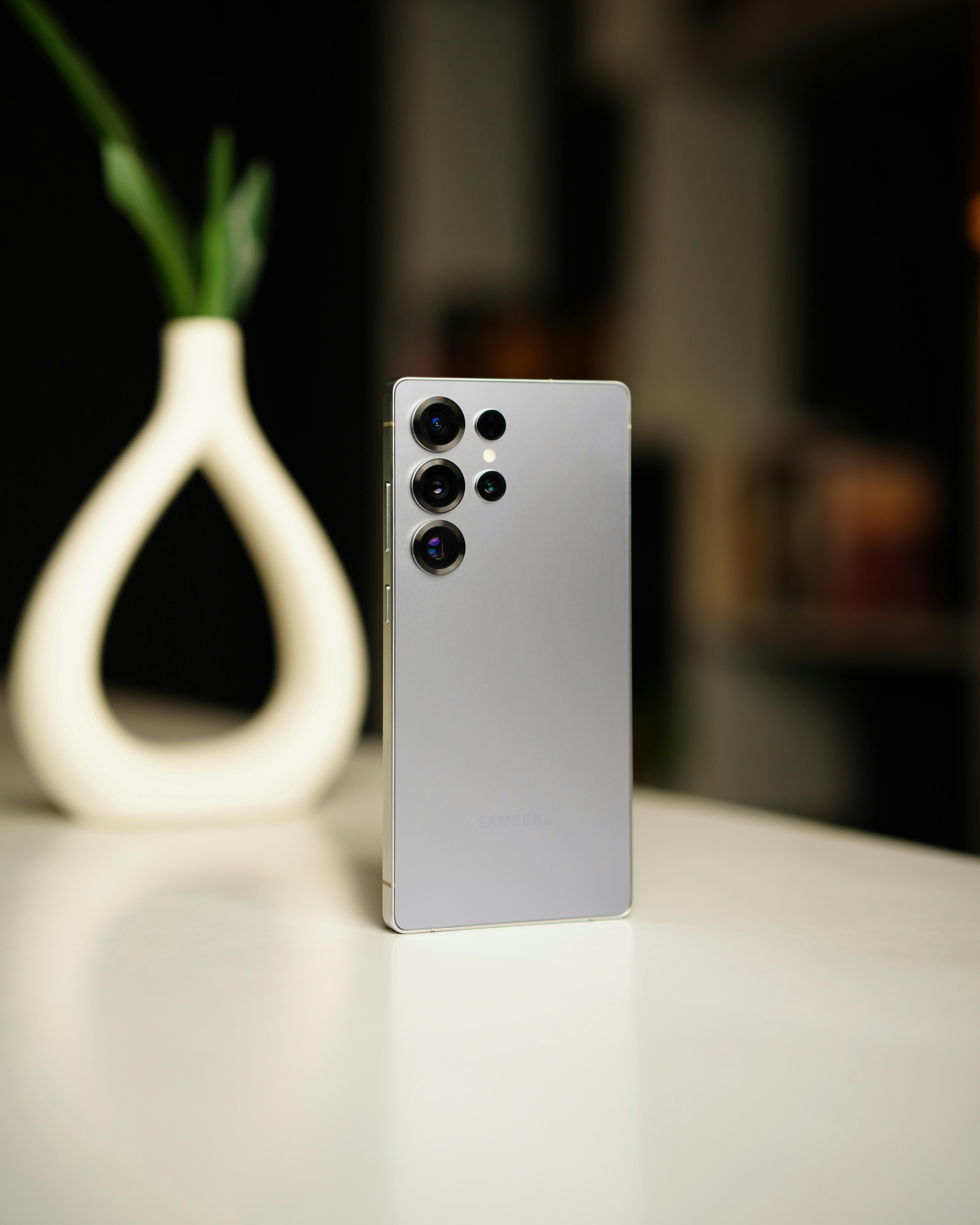 Elegant Smartphone on Minimalist Shelf · Free Stock Photo