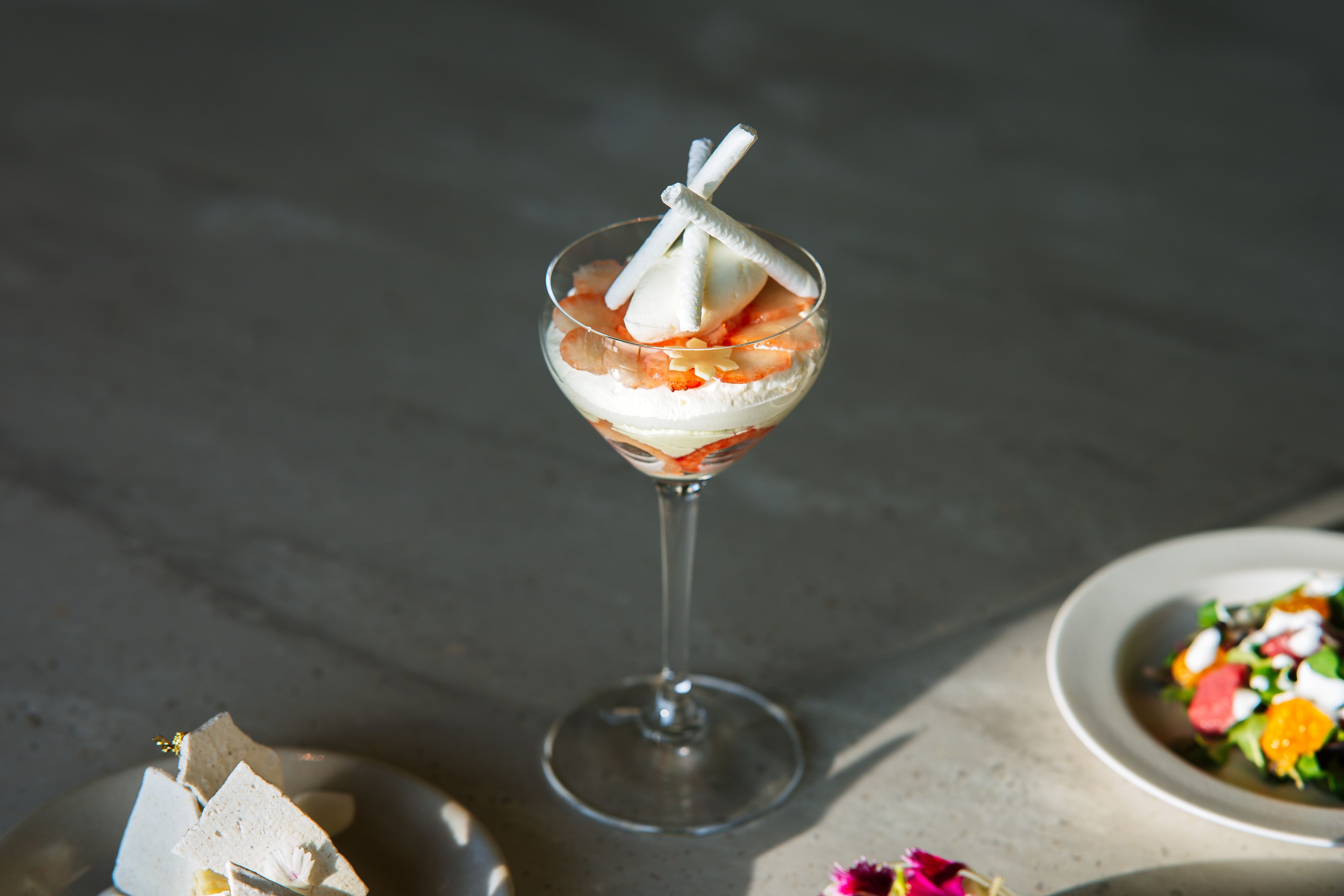 Elegant Meringue Dessert with Fresh Fruit in Glass · Free Stock Photo