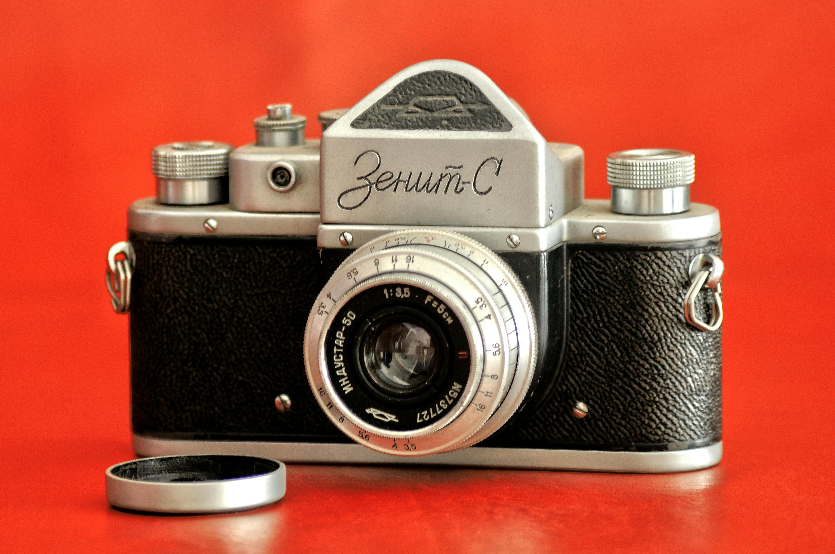 Vintage Zenit-S Camera on Red Background · Free Stock Photo