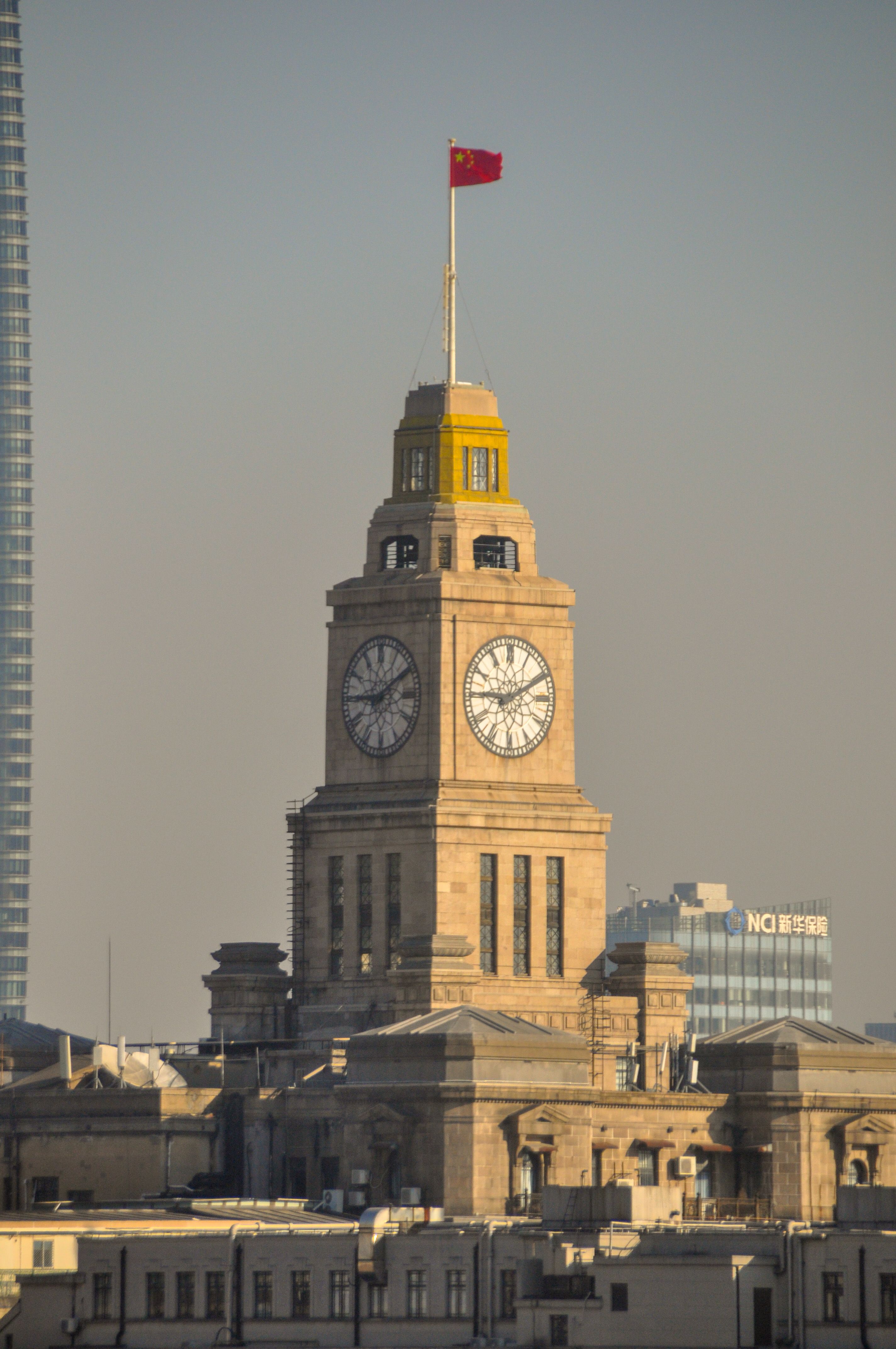 Iconic Clock Tower in Shanghai at Daytime · Free Stock Photo