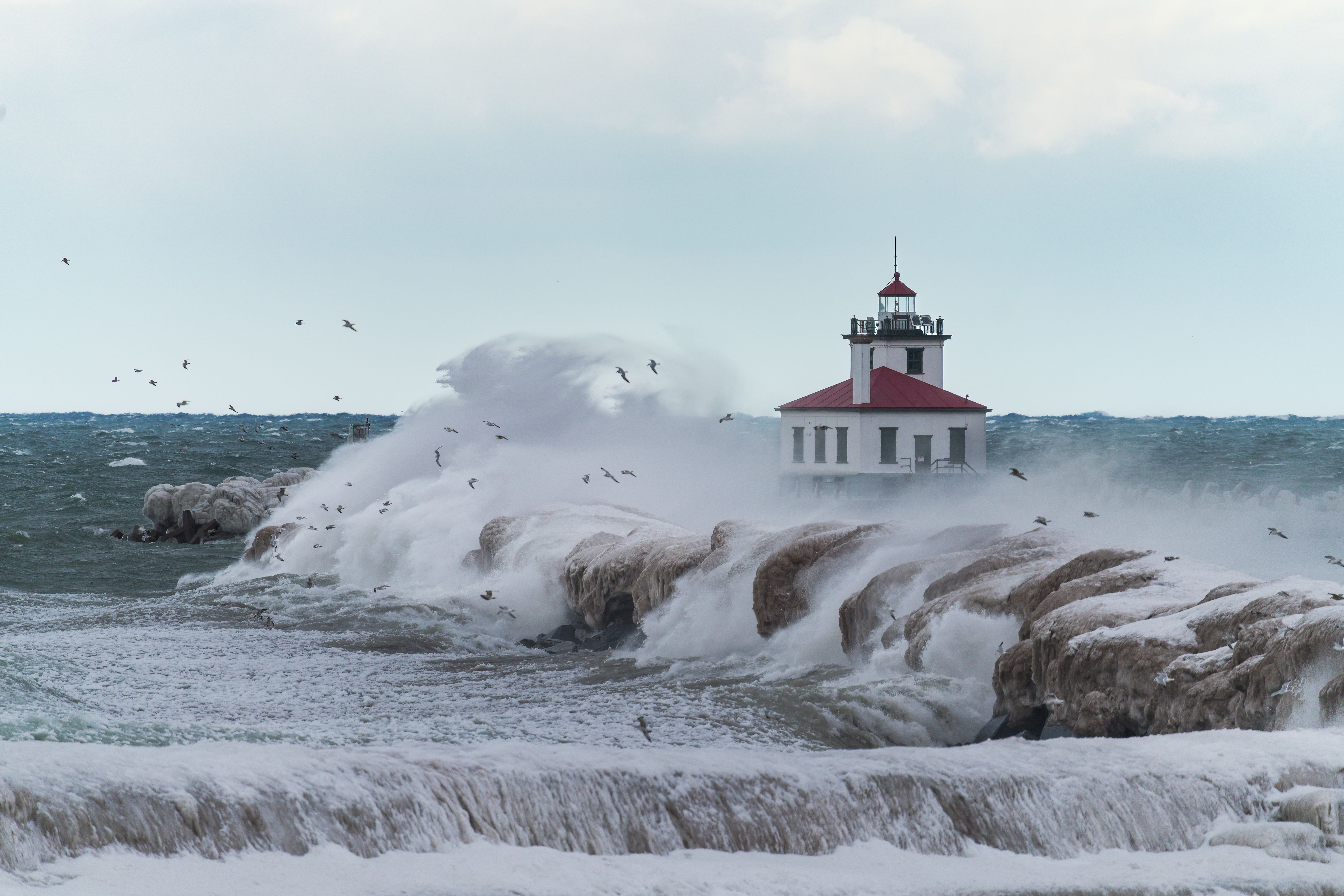Dramatic Waves Crash Against Oswego Lighthouse · Free Stock Photo