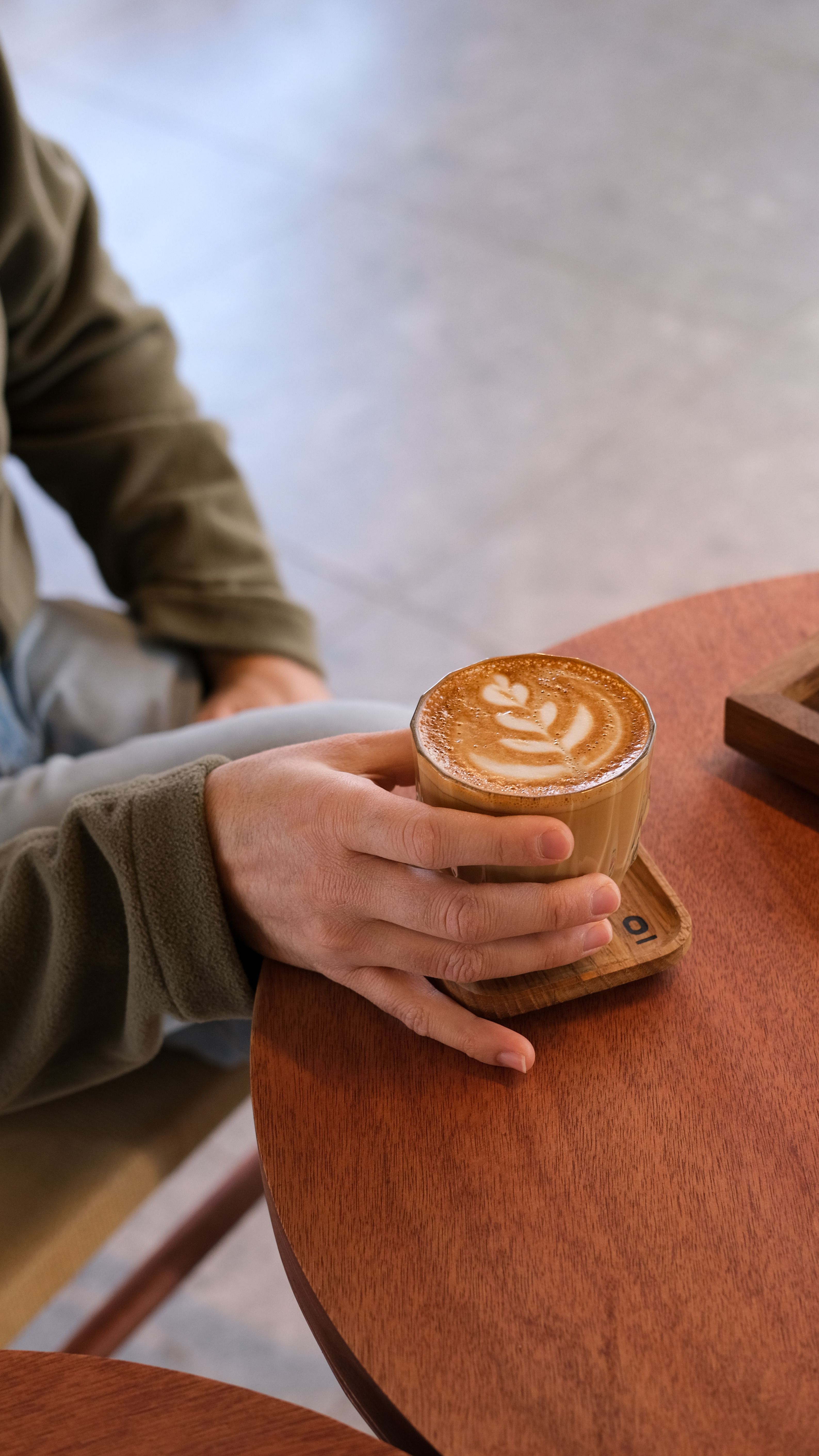 Cozy Coffee Moment in a Stylish Cafe · Free Stock Photo