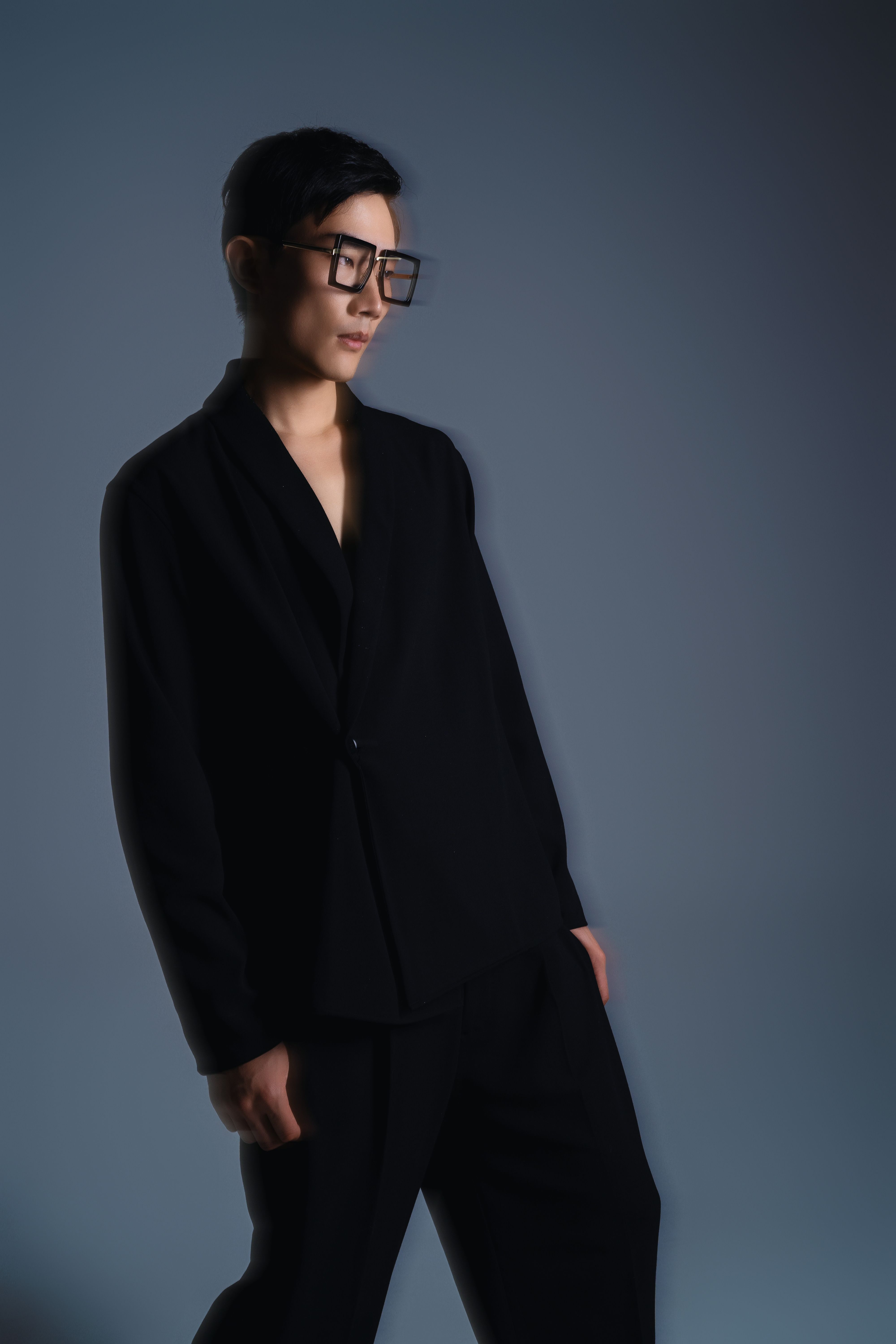 Contemporary Fashion Portrait in Moody Lighting · Free Stock Photo