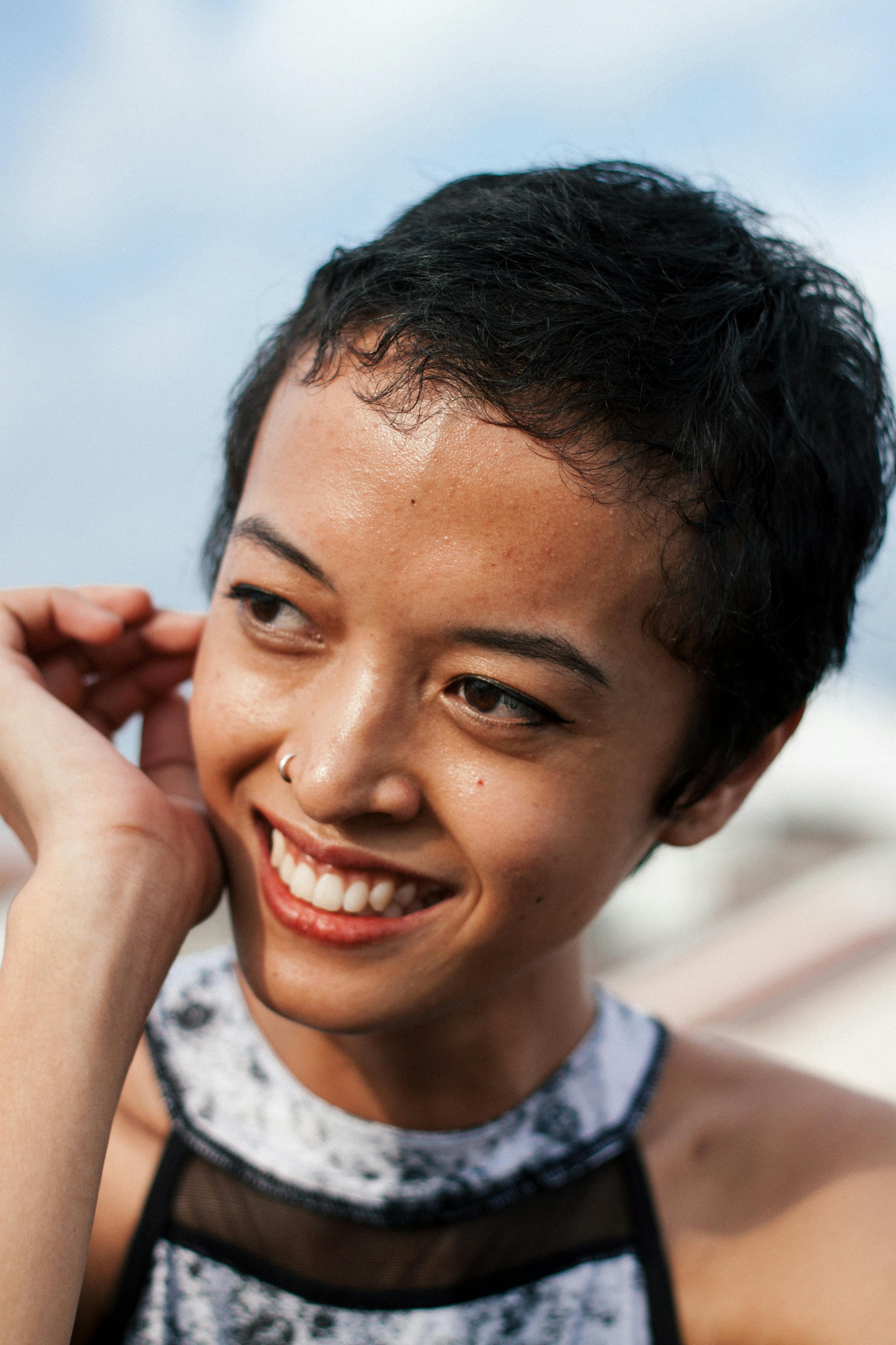 Close-Up Photography of Smiling Woman · Free Stock Photo