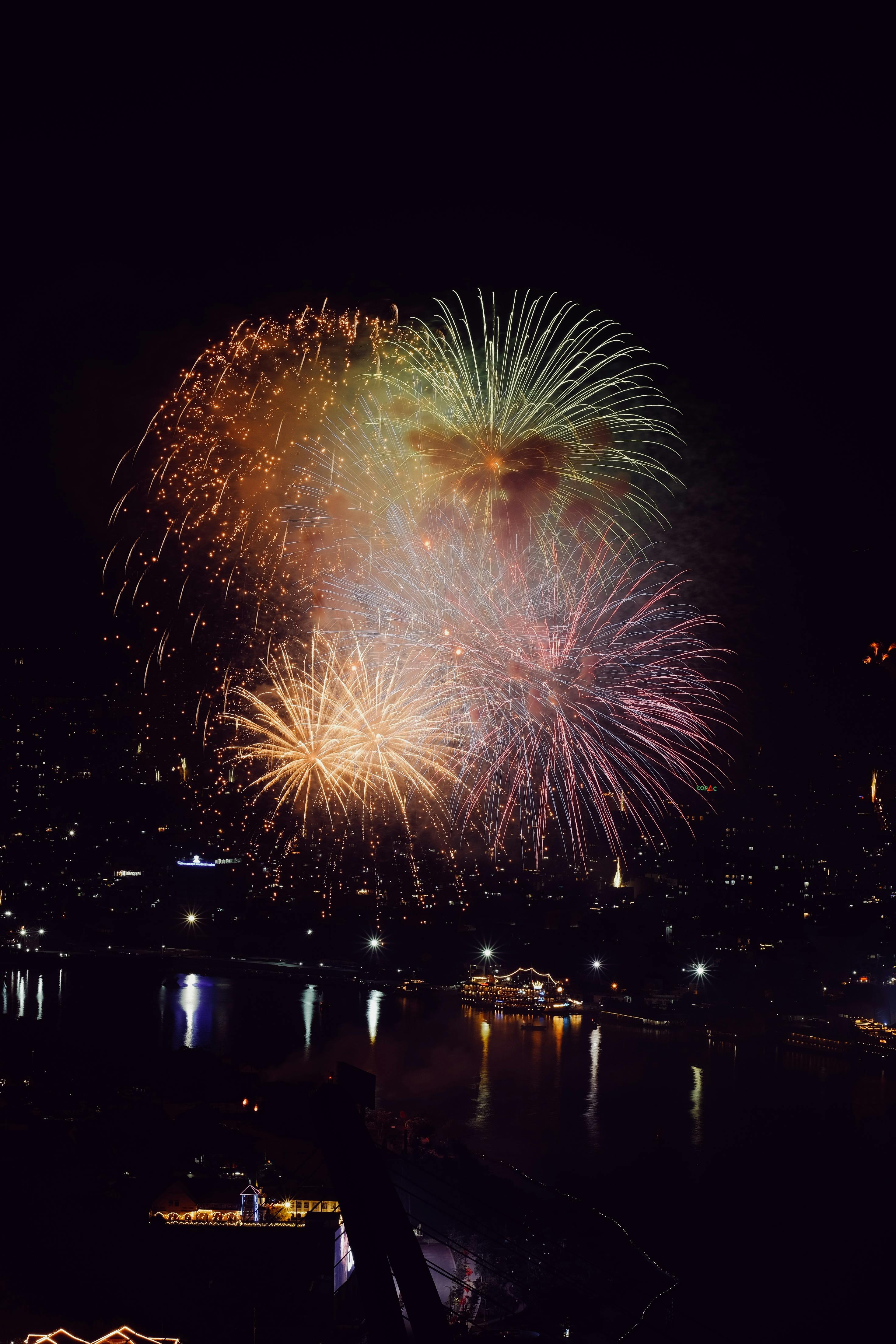 Breathtaking Fireworks Over City Skyline at Night · Free Stock Photo