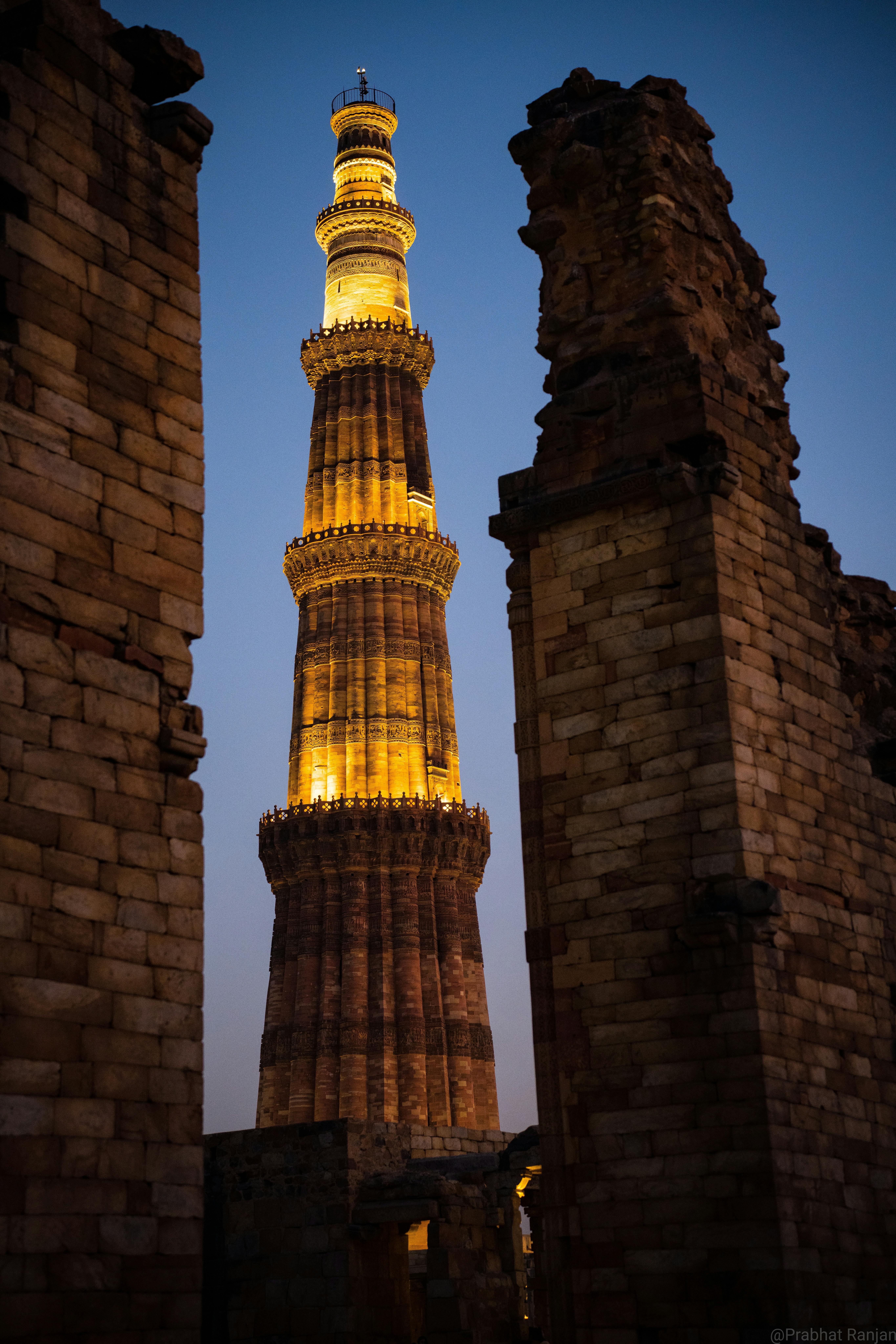Illuminated Qutub Minar at Twilight · Free Stock Photo