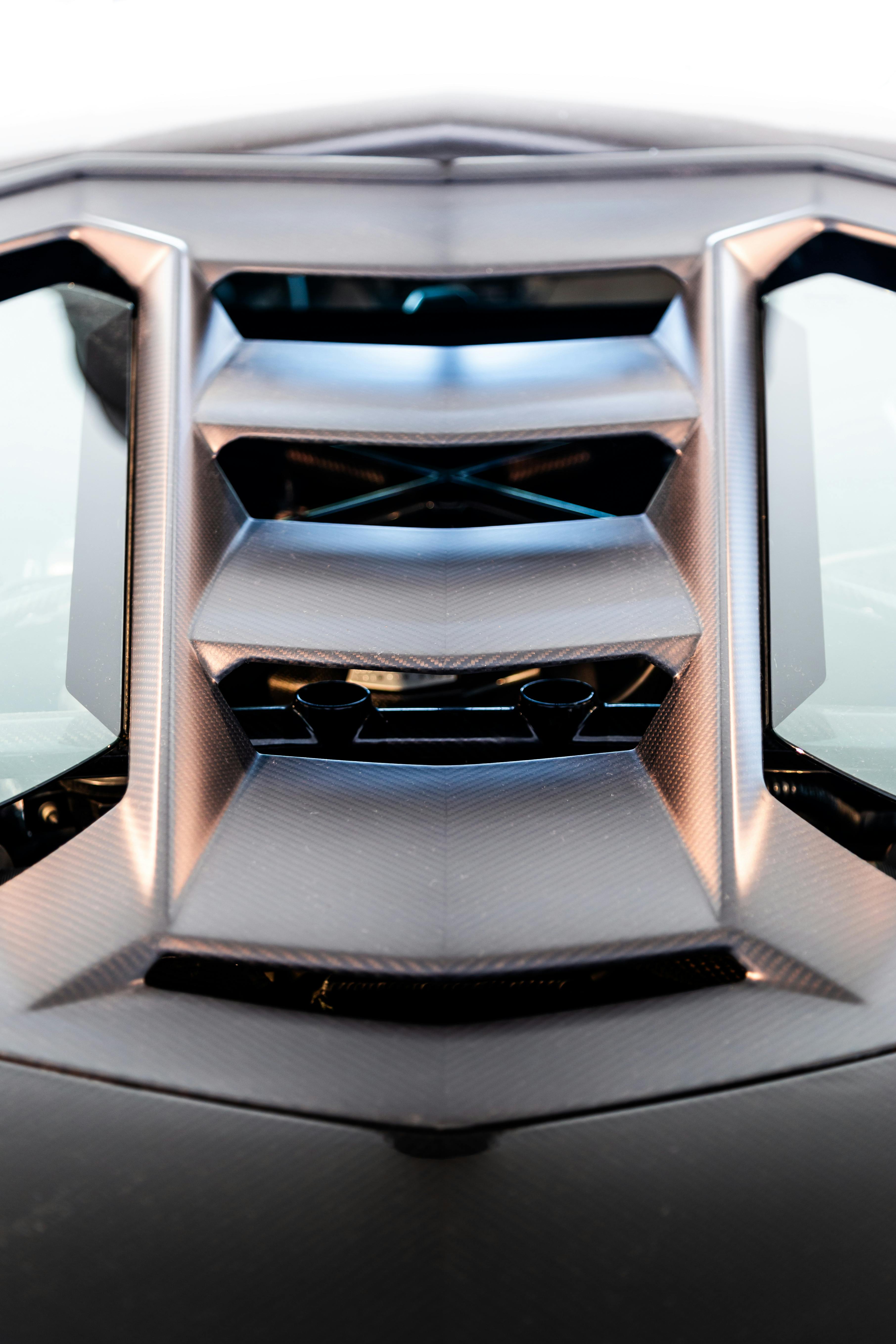 Close-Up of Luxury Sports Car Engine Vent · Free Stock Photo