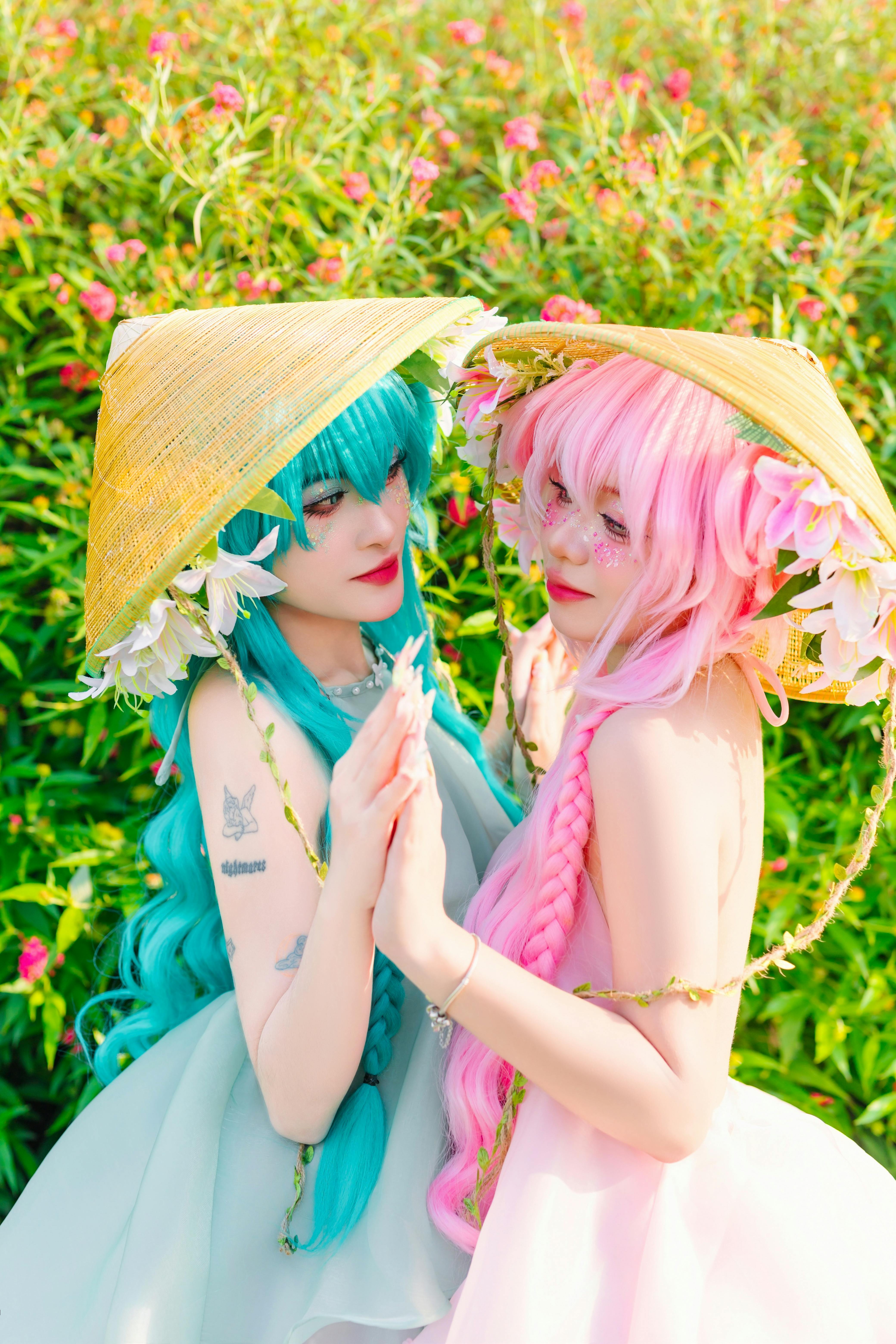 Vibrant Cosplay in Floral Garden Setting · Free Stock Photo
