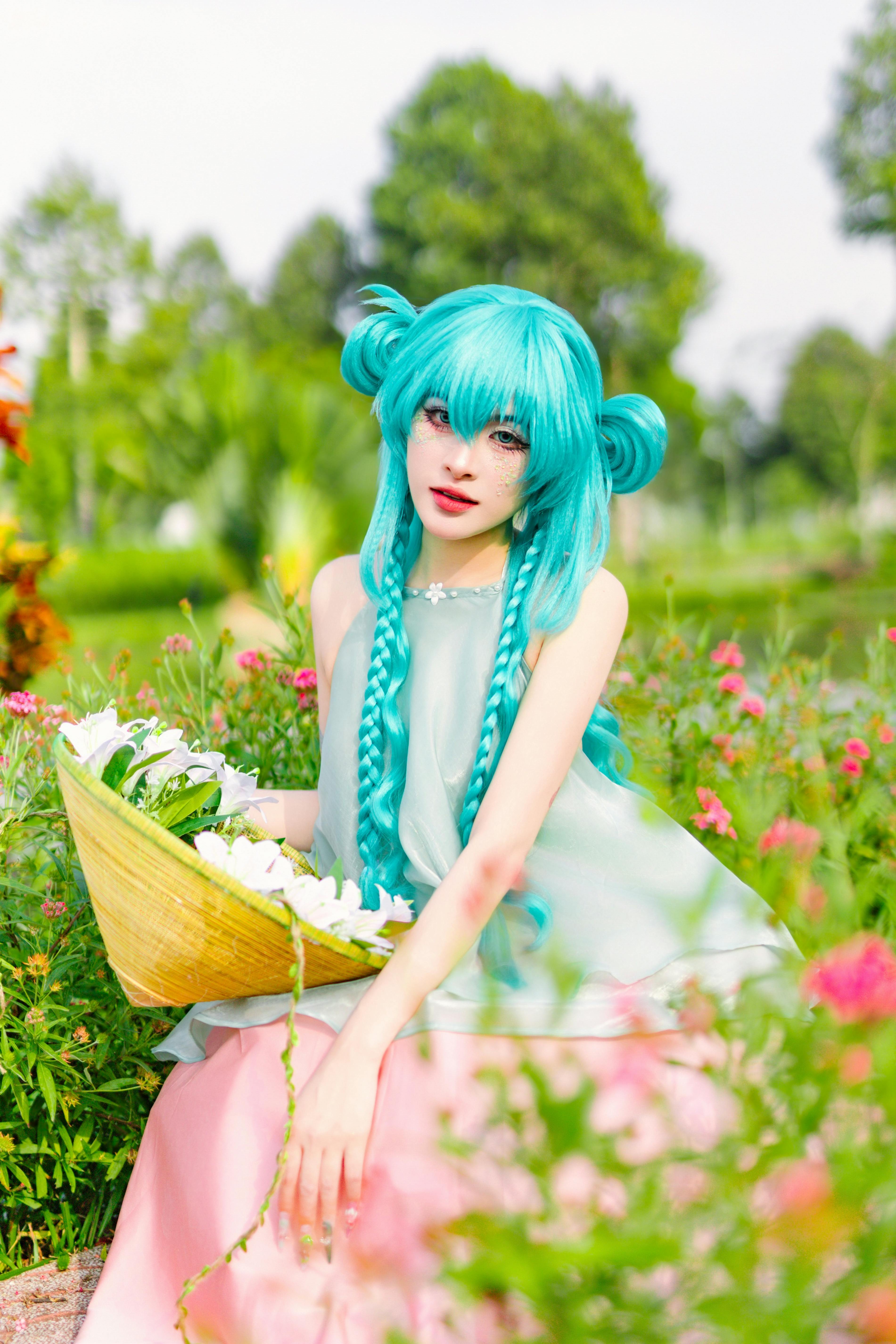Cosplayer in Vibrant Outdoor Garden Setting · Free Stock Photo