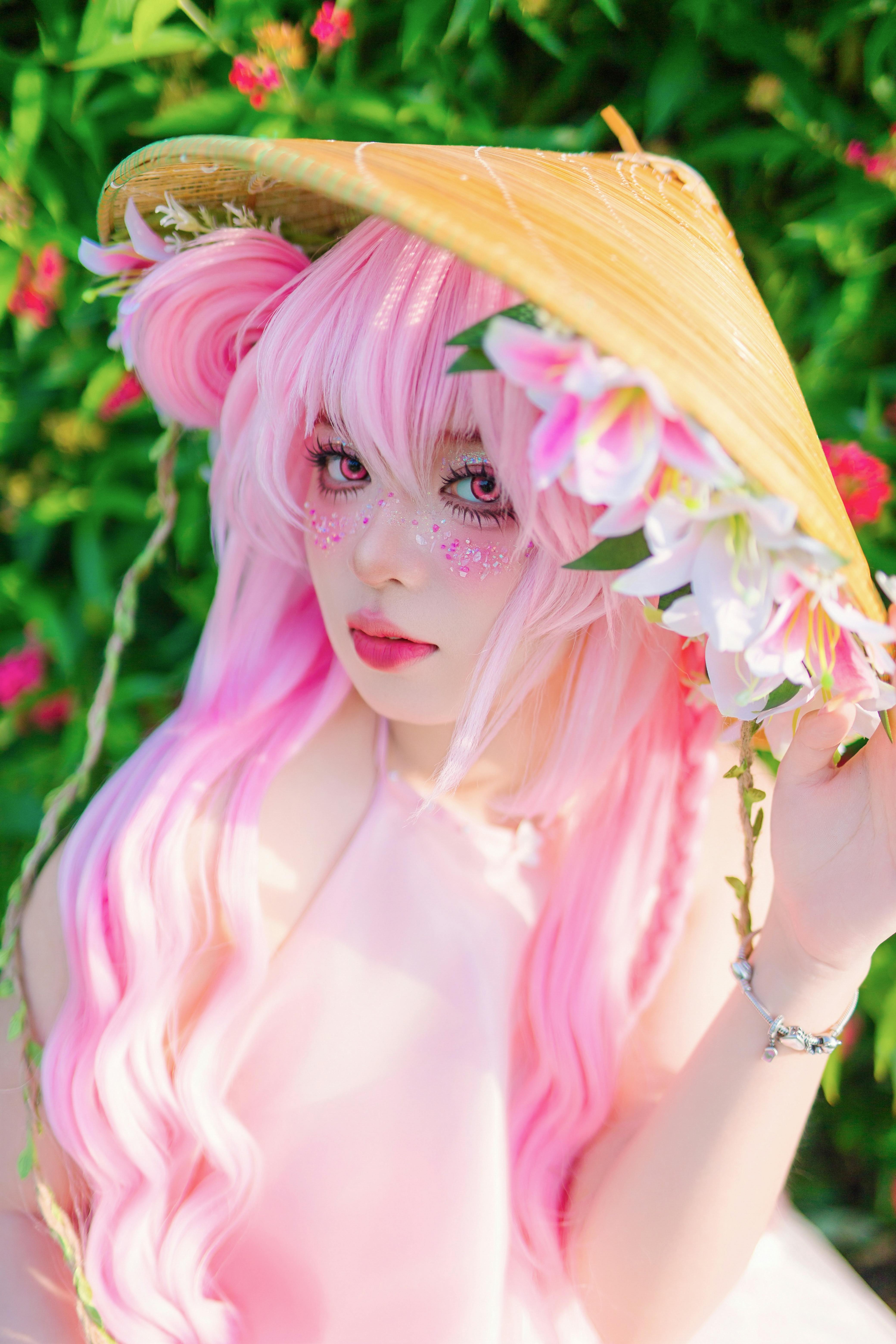 Cosplay Portrait with Pink Hair and Floral Hat · Free Stock Photo