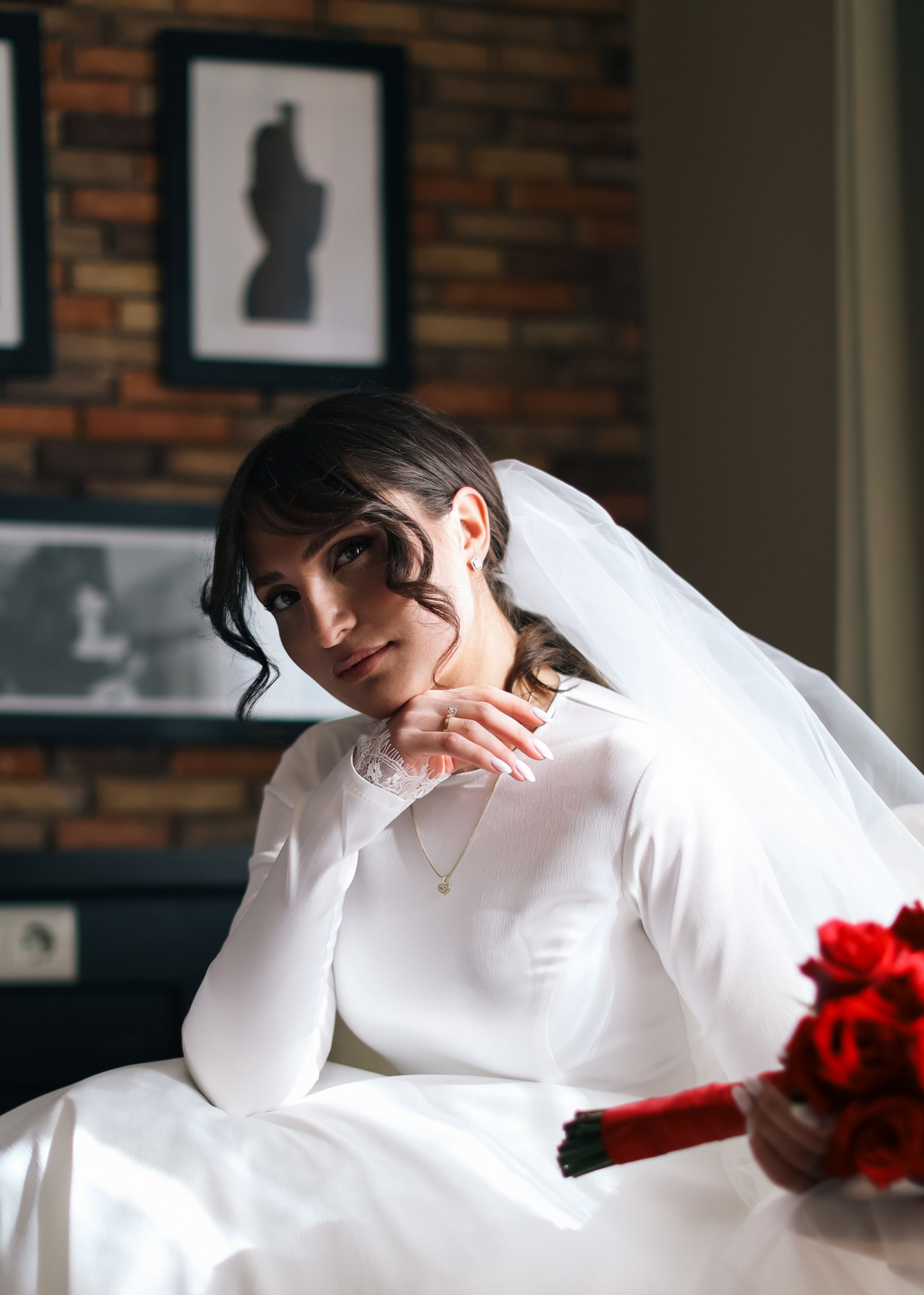 Elegant Bride Posing Indoors with Bouquet · Free Stock Photo