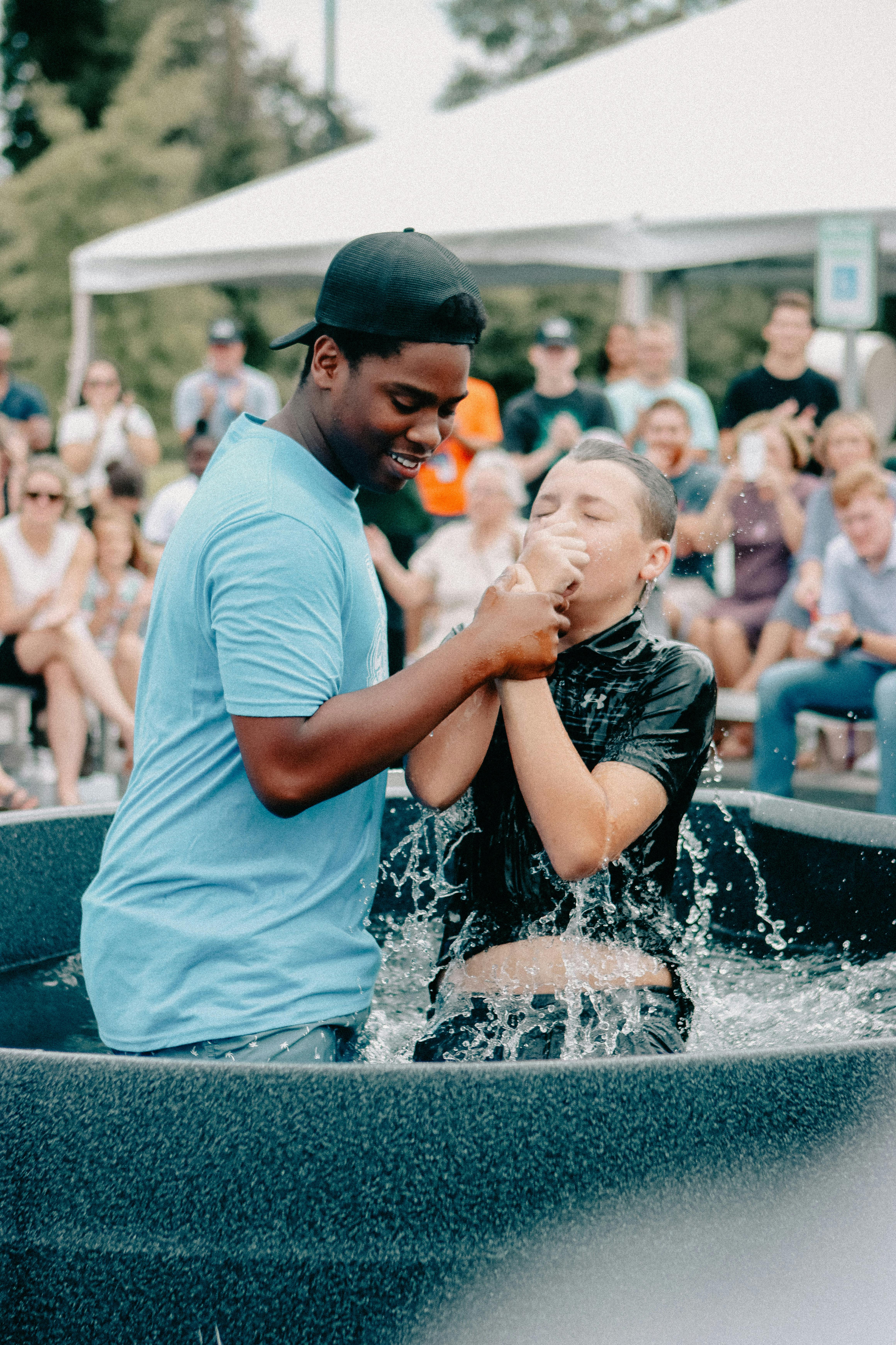 Joyful Outdoor Baptism Celebration in Clemson · Free Stock Photo