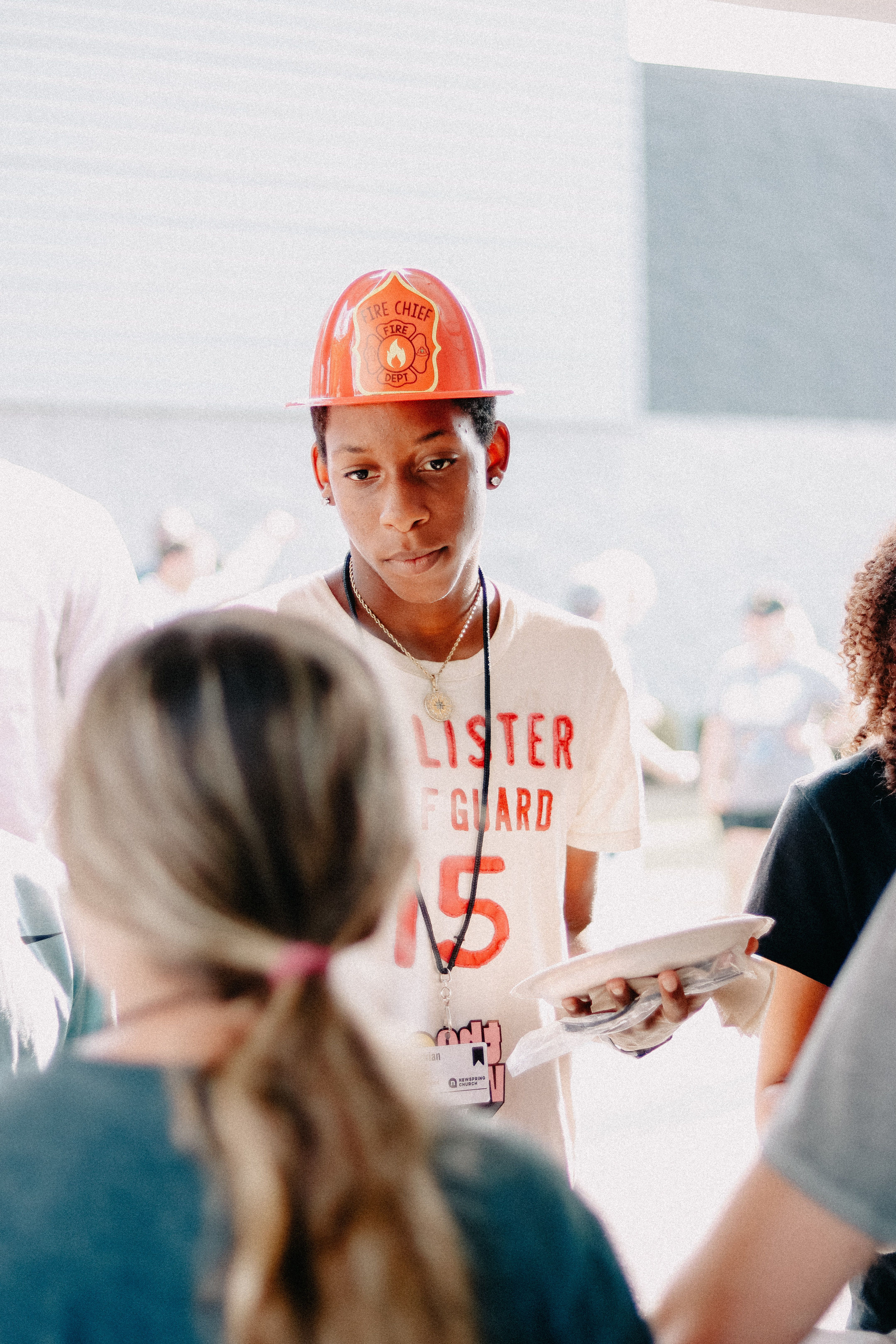 Youth Volunteer Serving at Community Event · Free Stock Photo