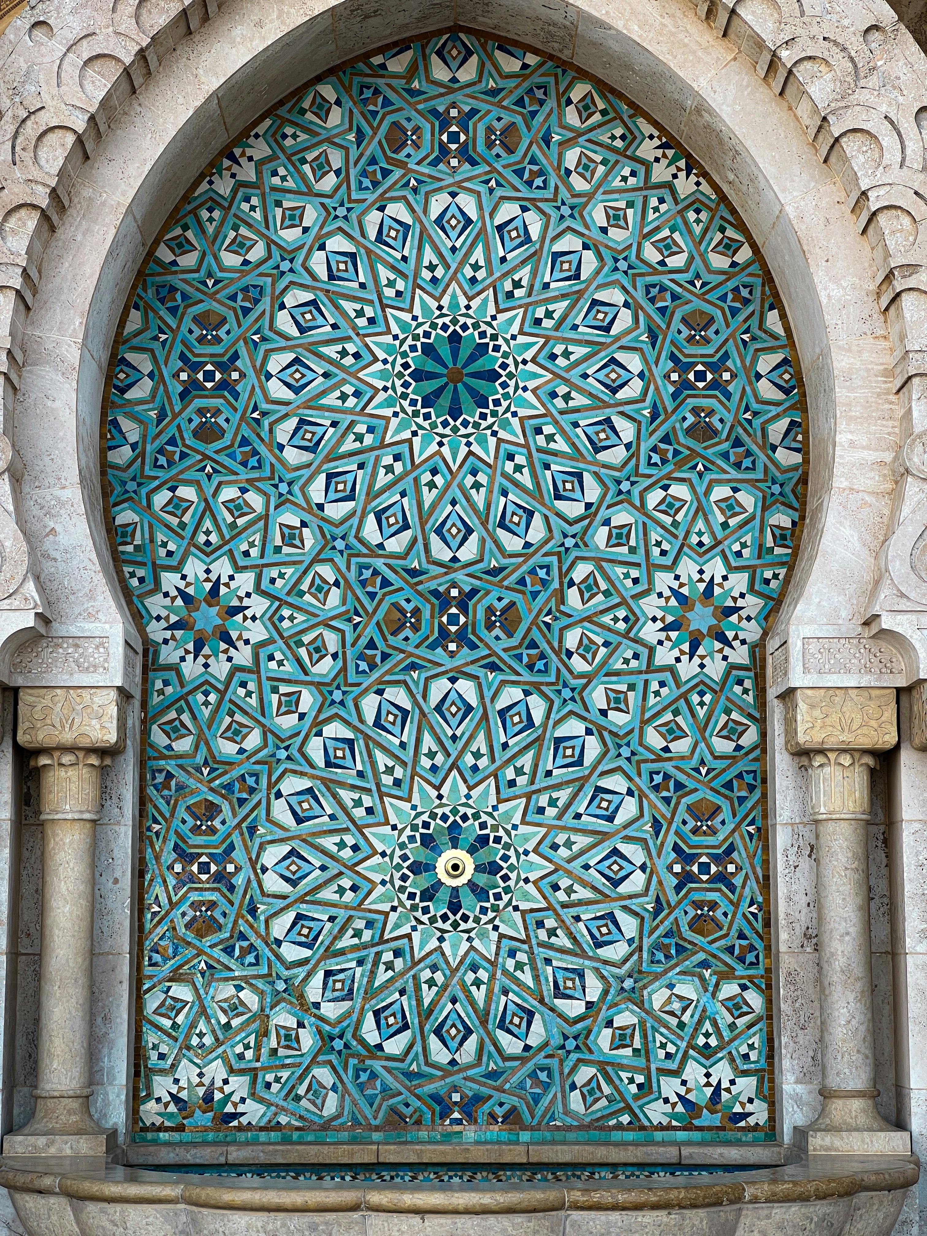 Intricate Moroccan Tile Mosaic in Archway · Free Stock Photo
