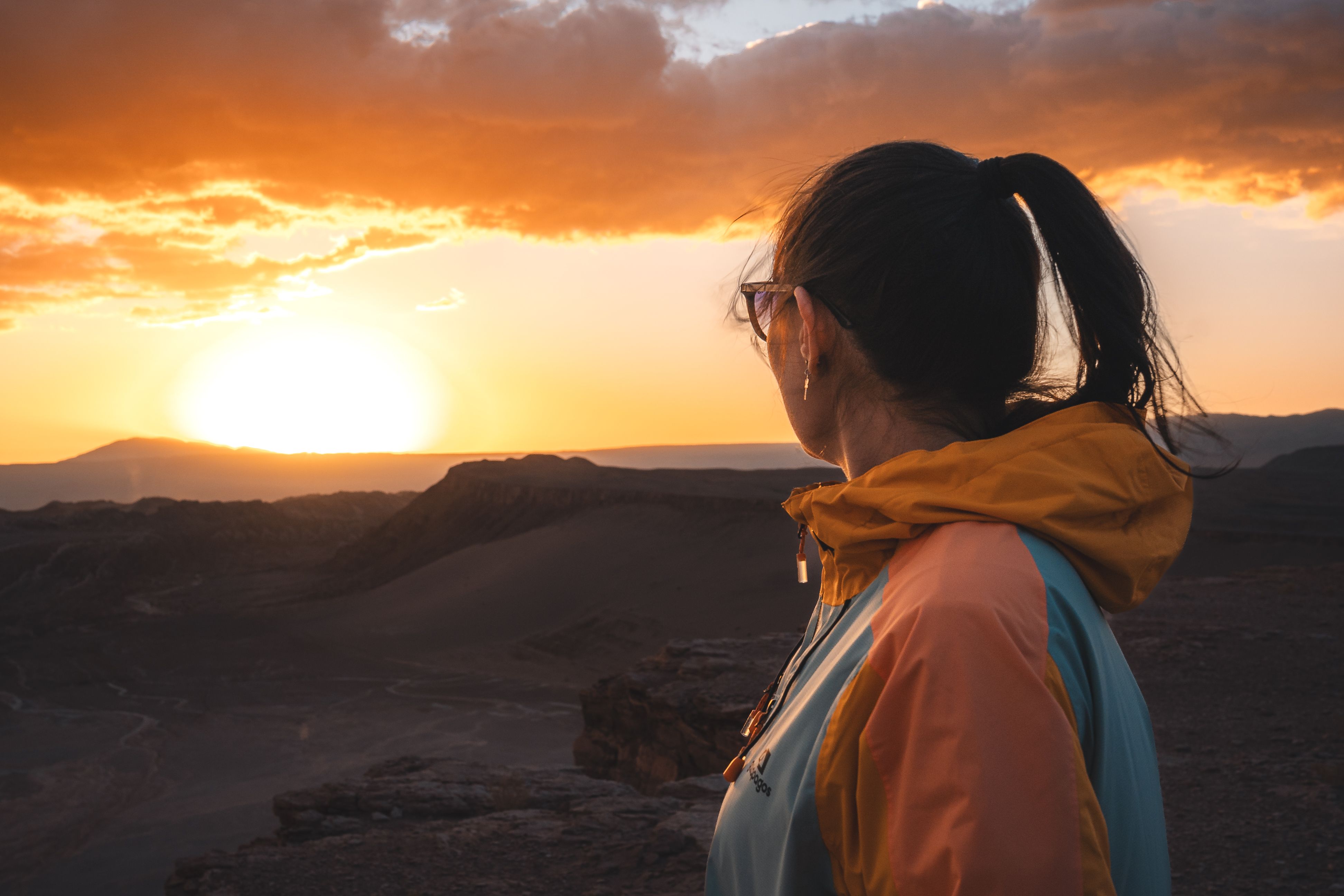 Woman Watching Sunset in Mountain Landscape · Free Stock Photo
