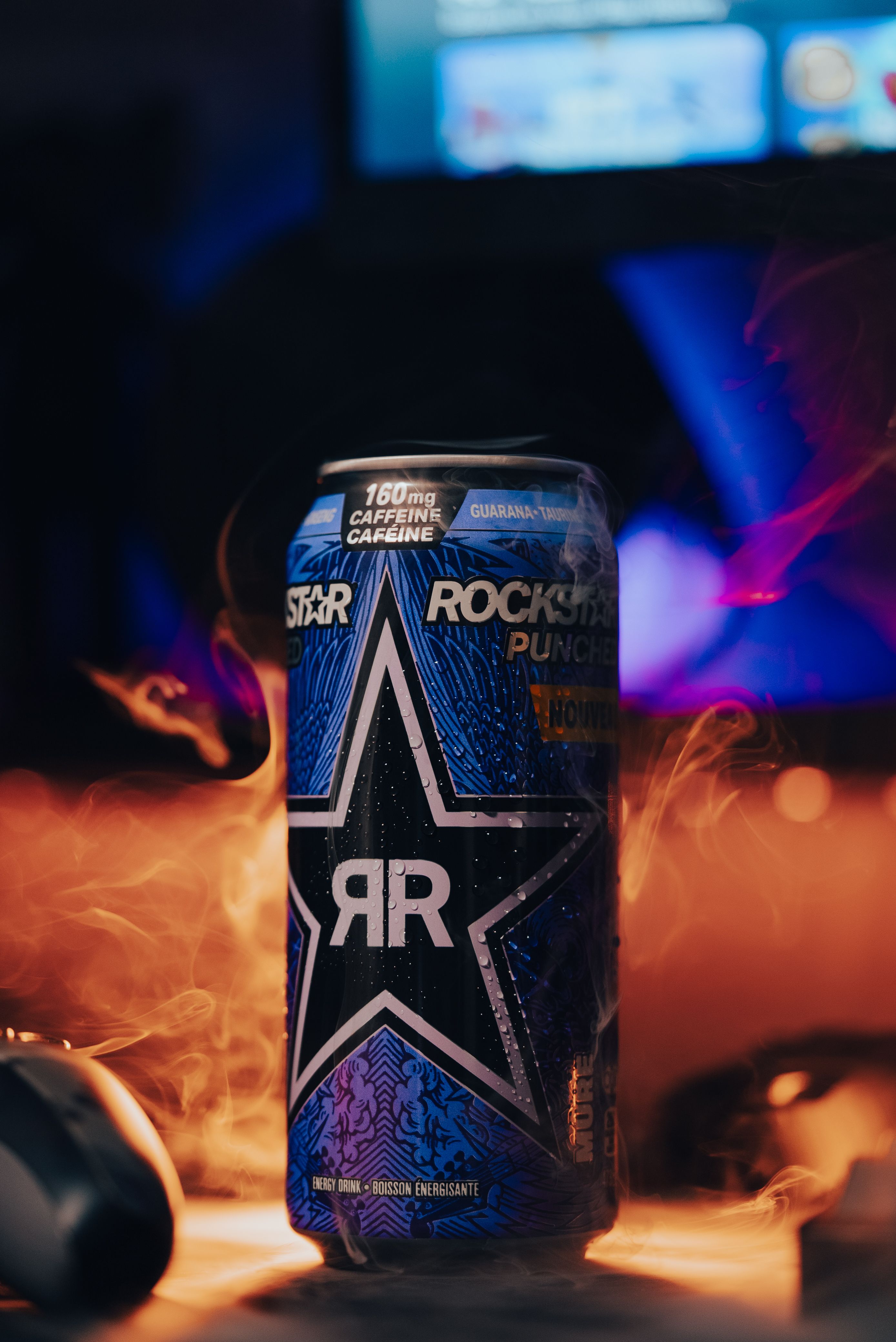Vibrant Rockstar Energy Drink Can with Neon Glow · Free Stock Photo