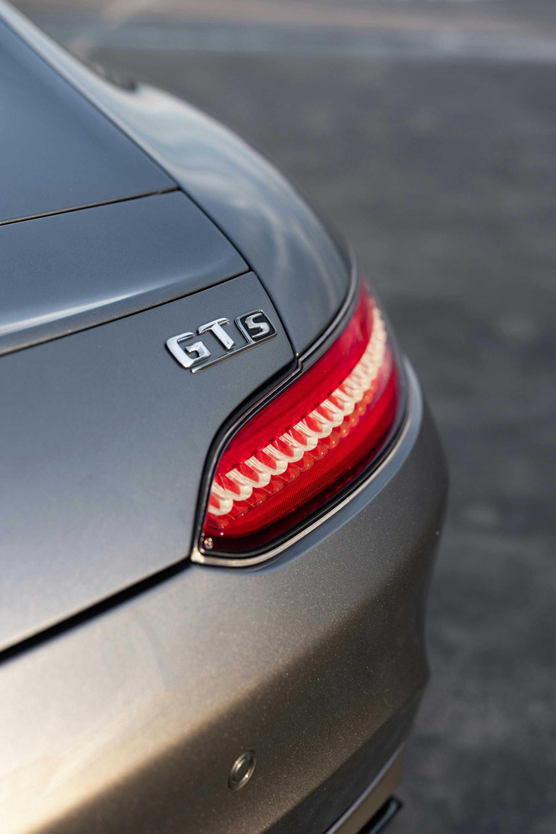 Close-Up of Luxury Sports Car Tail Light GTS · Free Stock Photo