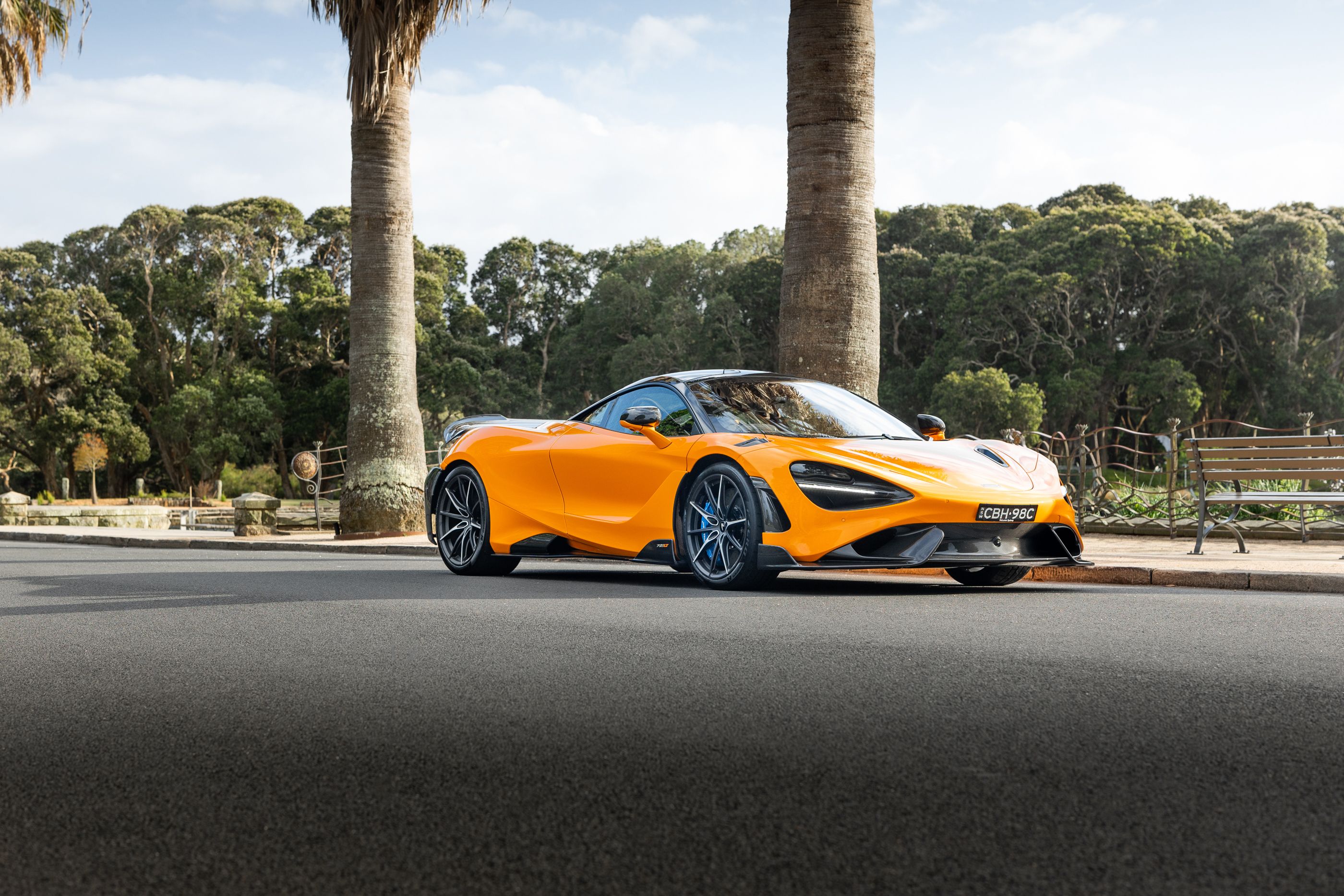 Vibrant Orange McLaren 765LT in Sydney Park · Free Stock Photo
