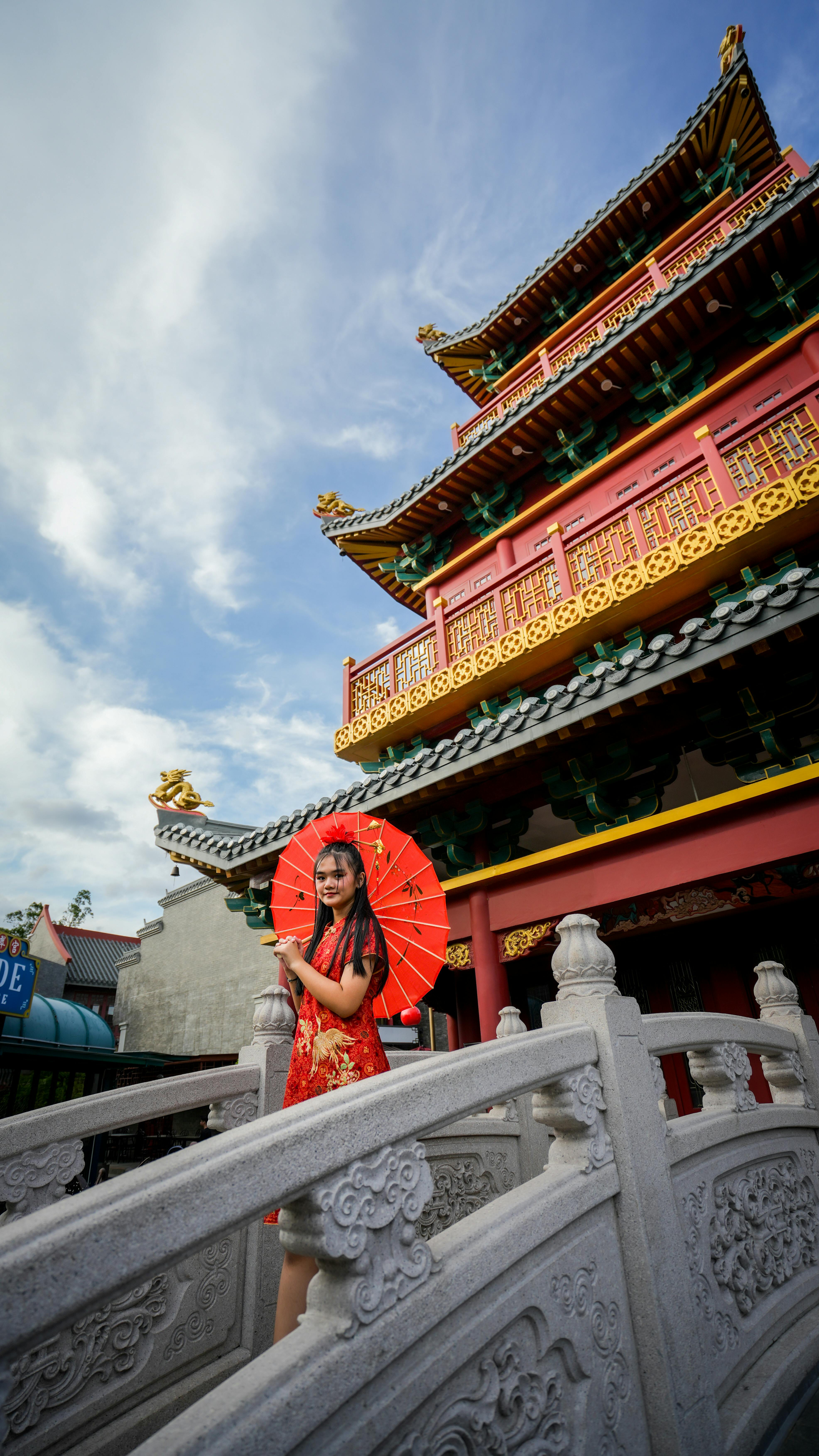 Elegant Asian Model Posing by Chinese Temple · Free Stock Photo
