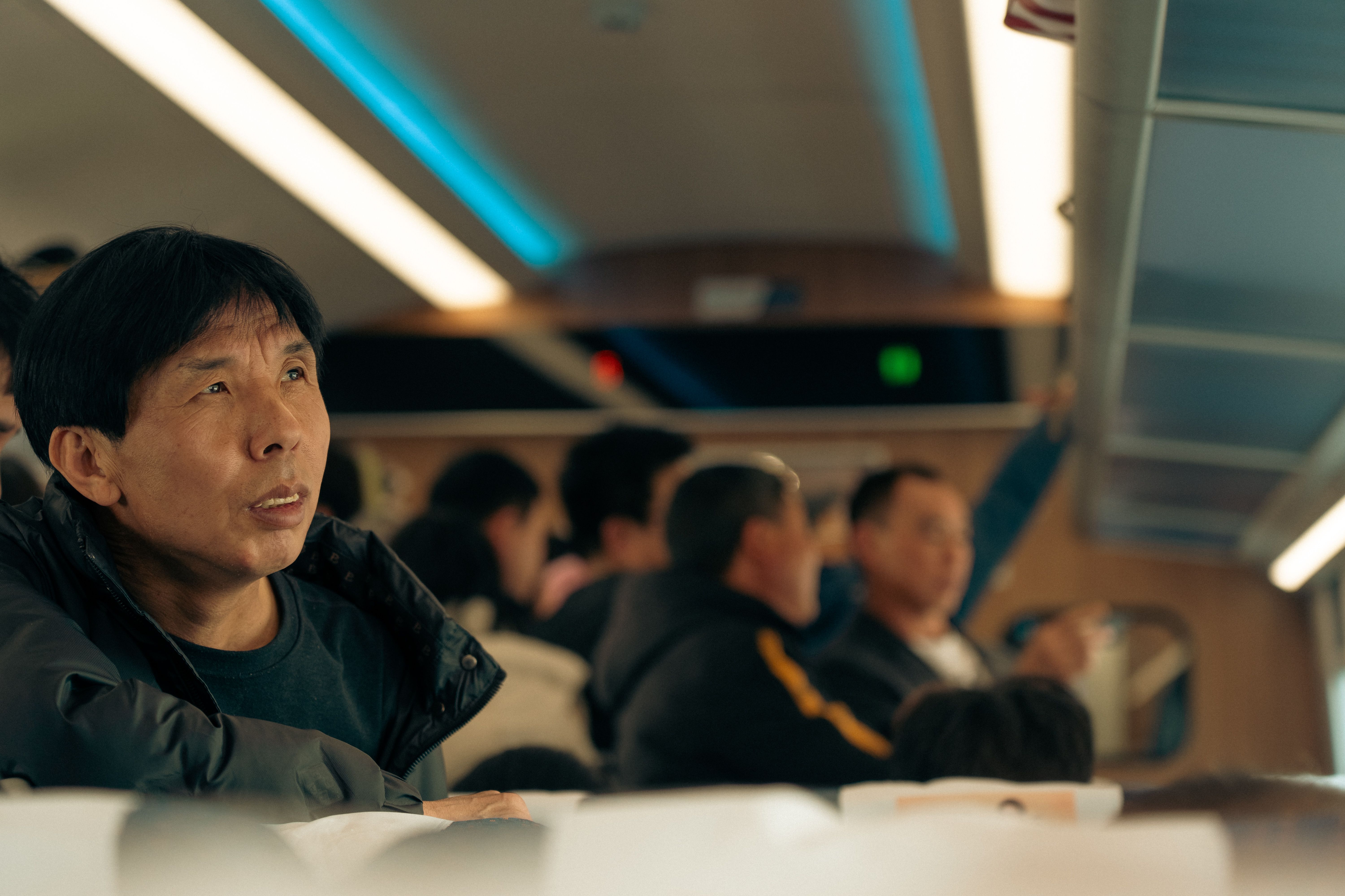 Group of People Traveling on a Train · Free Stock Photo