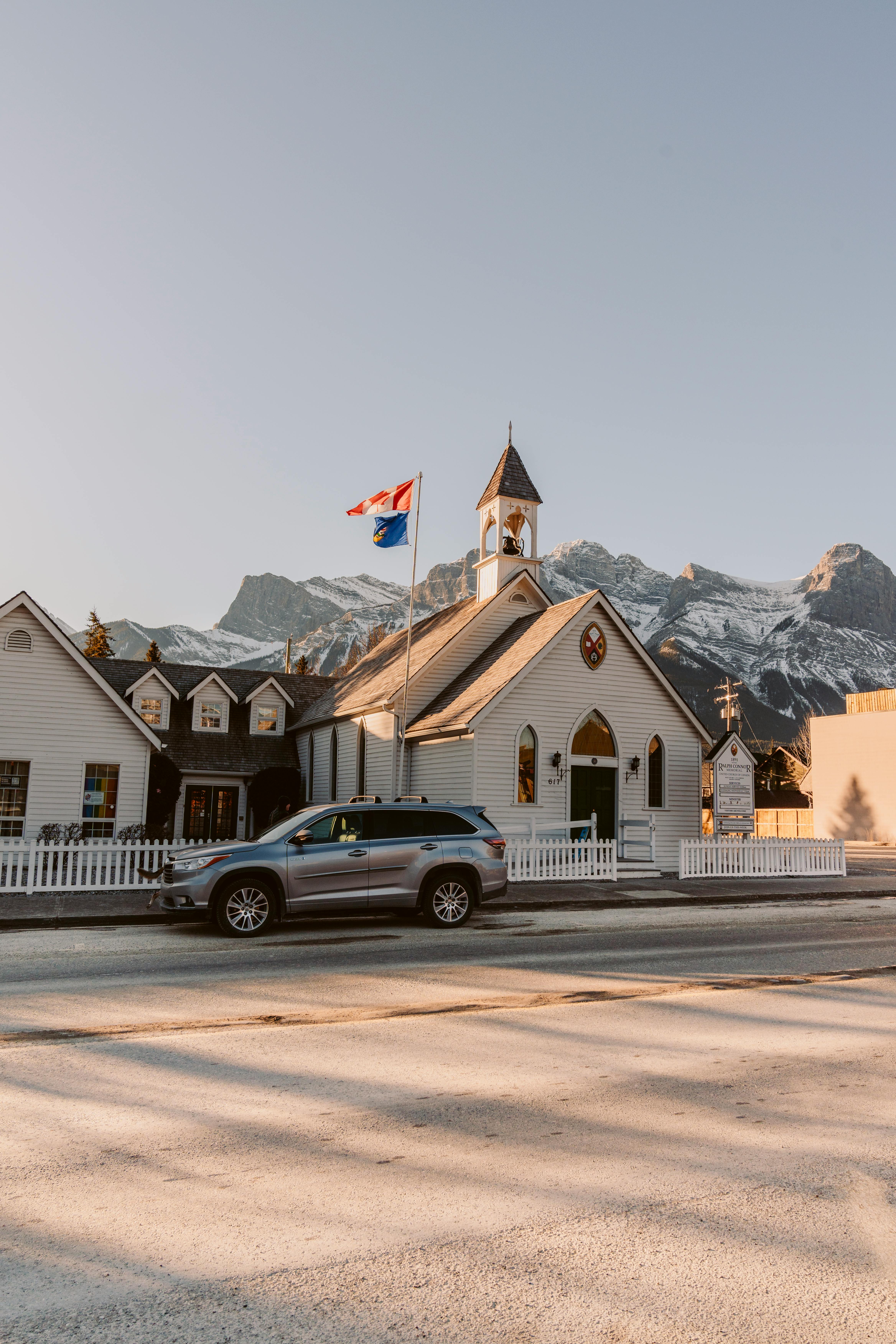 Charming Church and Mountain View in Canmore · Free Stock Photo