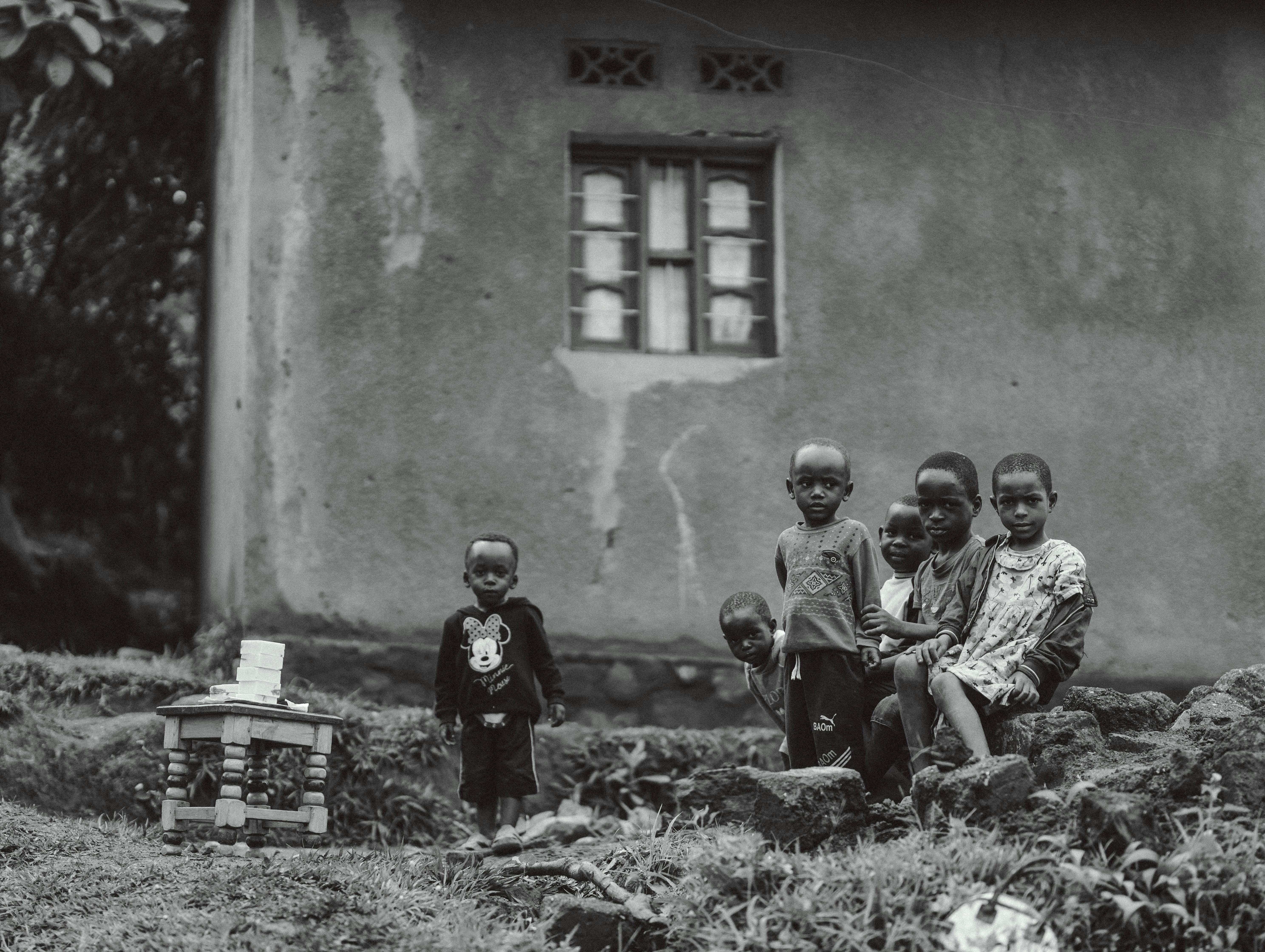 Children Playing Outside Rural House · Free Stock Photo