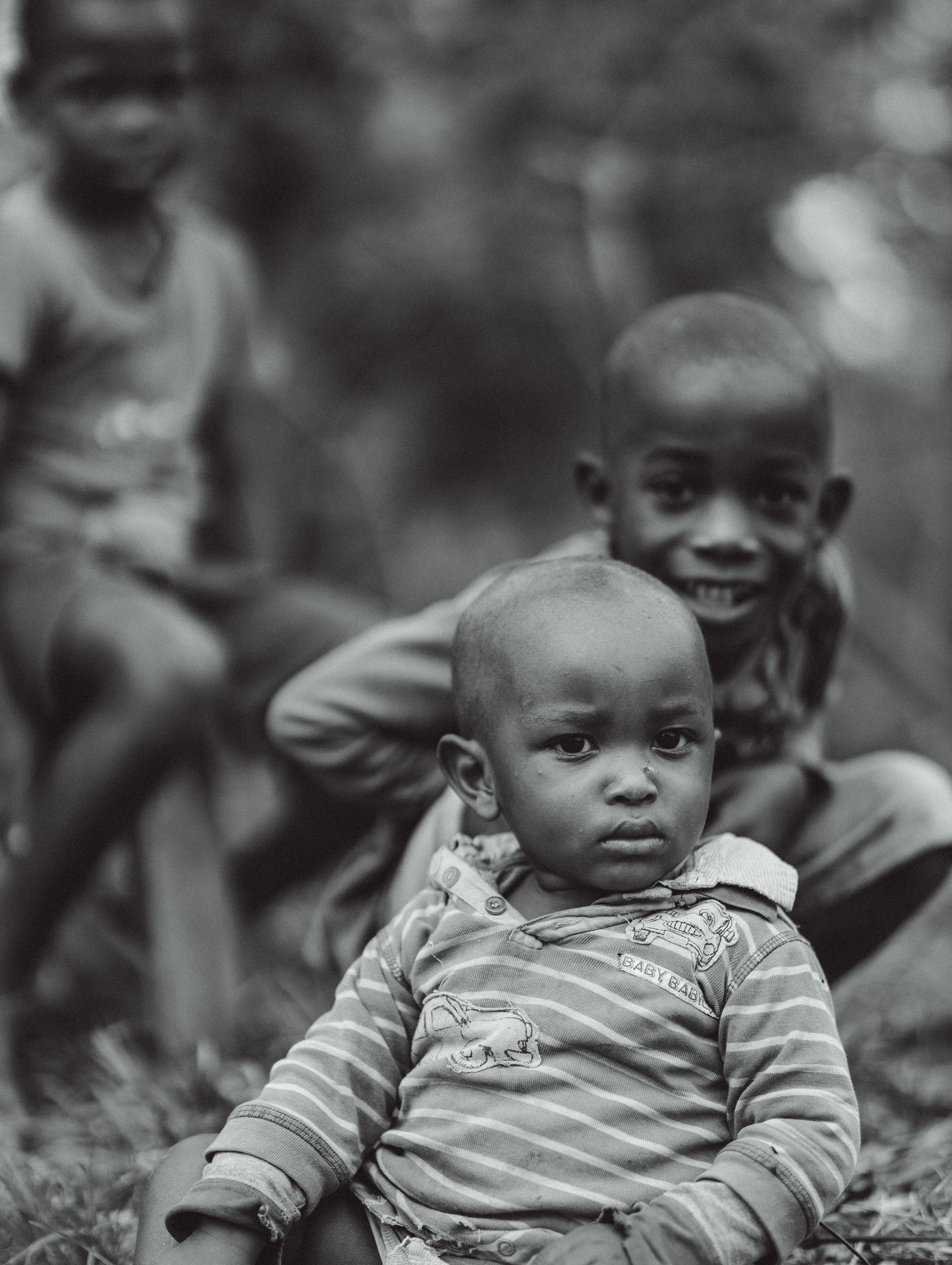 Children Playing Outdoors in Black and White · Free Stock Photo