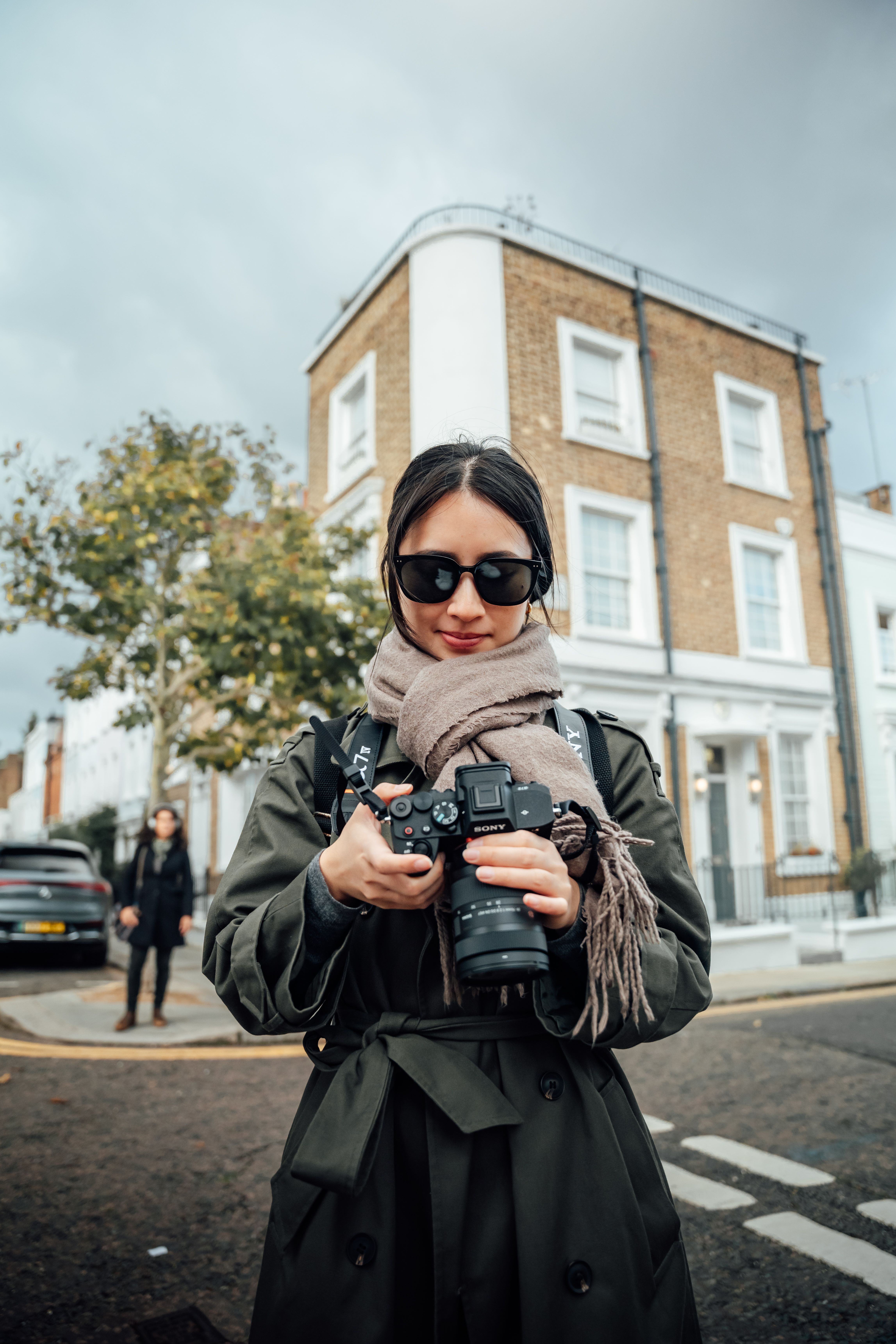 Stylish Photographer in London Street Setting · Free Stock Photo