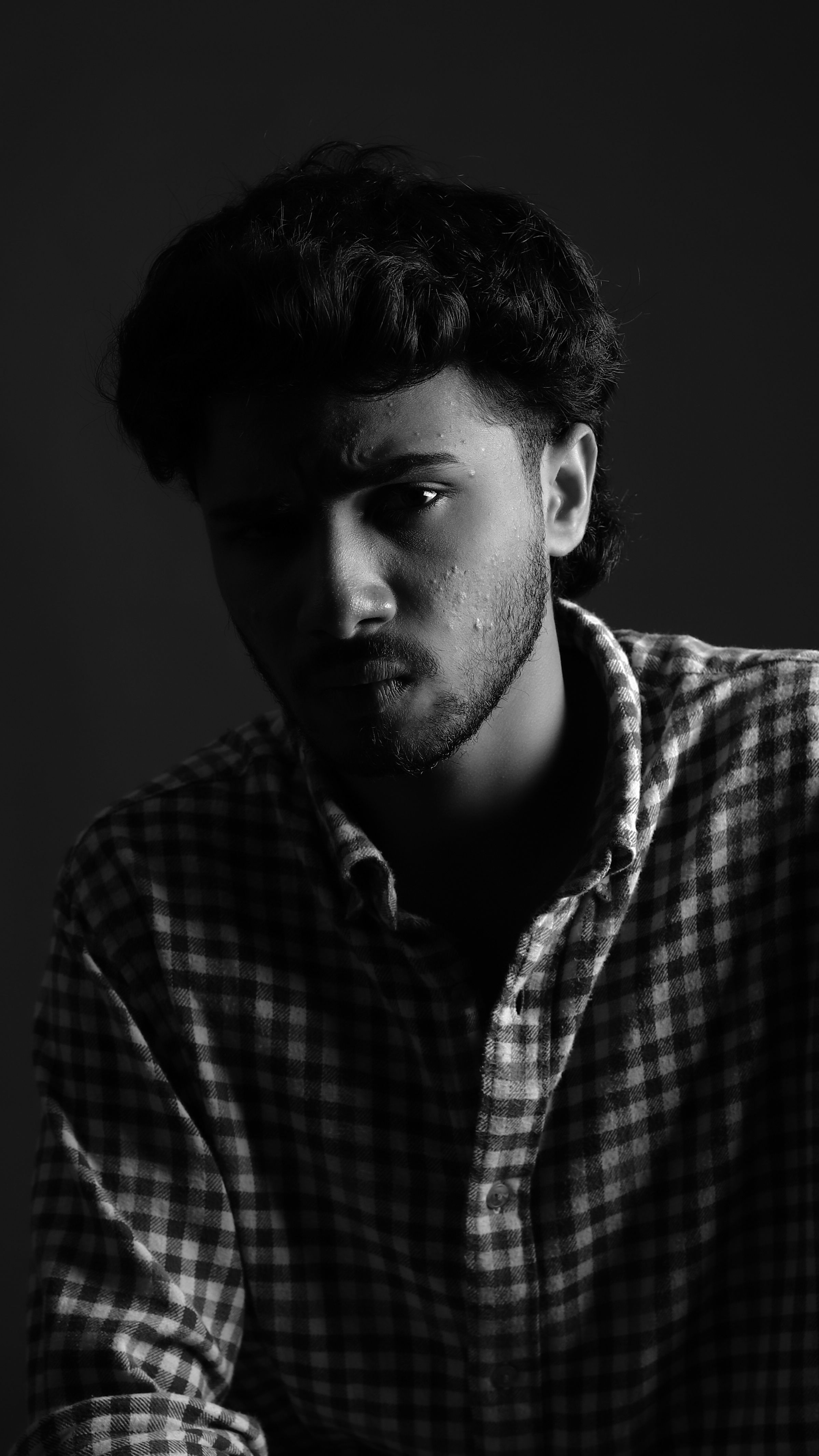 Dramatic Black and White Portrait of Young Man · Free Stock Photo