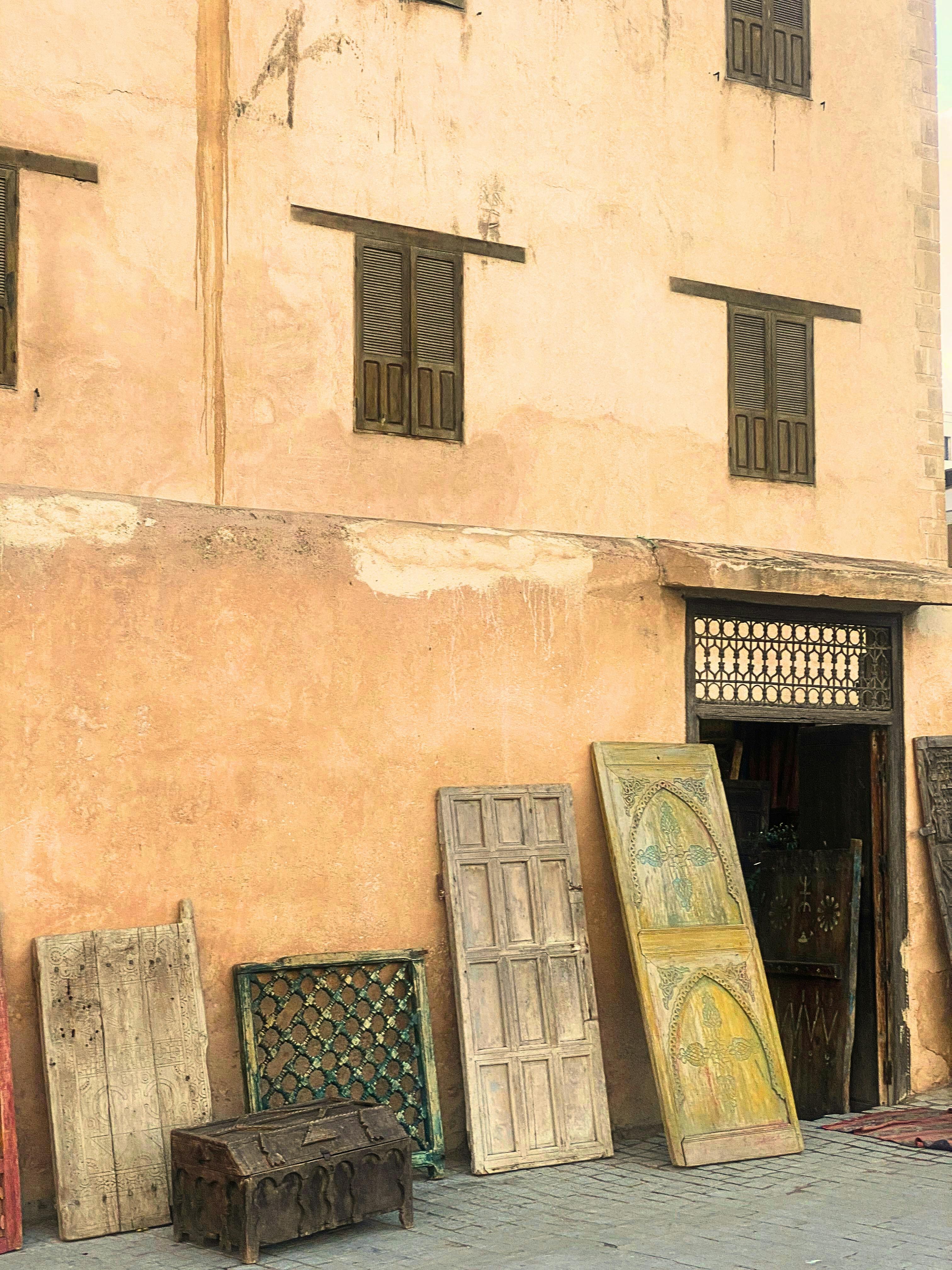 Rustic Antique Shop Facade with Wooden Panels · Free Stock Photo