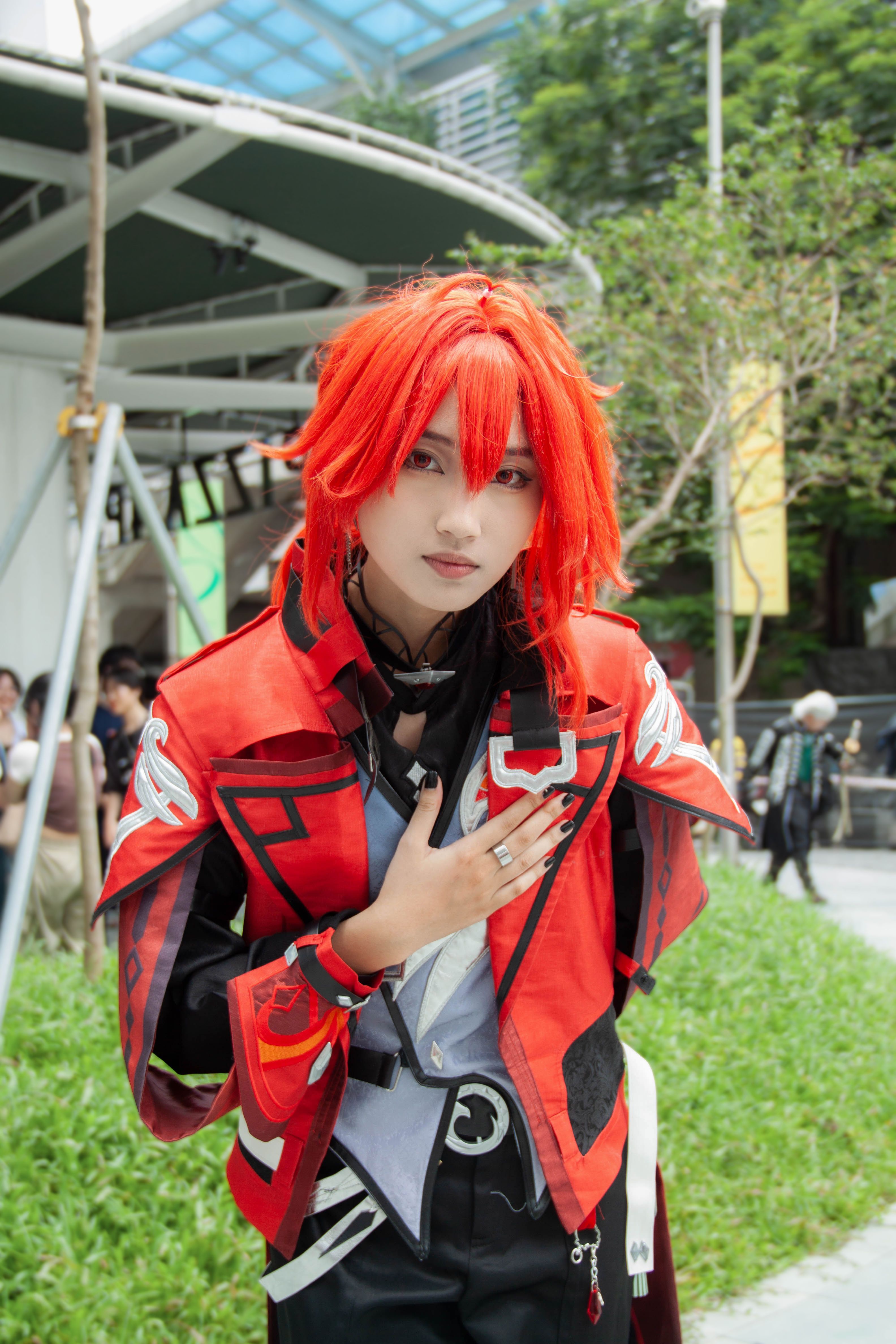 Cosplay Character in Vibrant Red Costume · Free Stock Photo